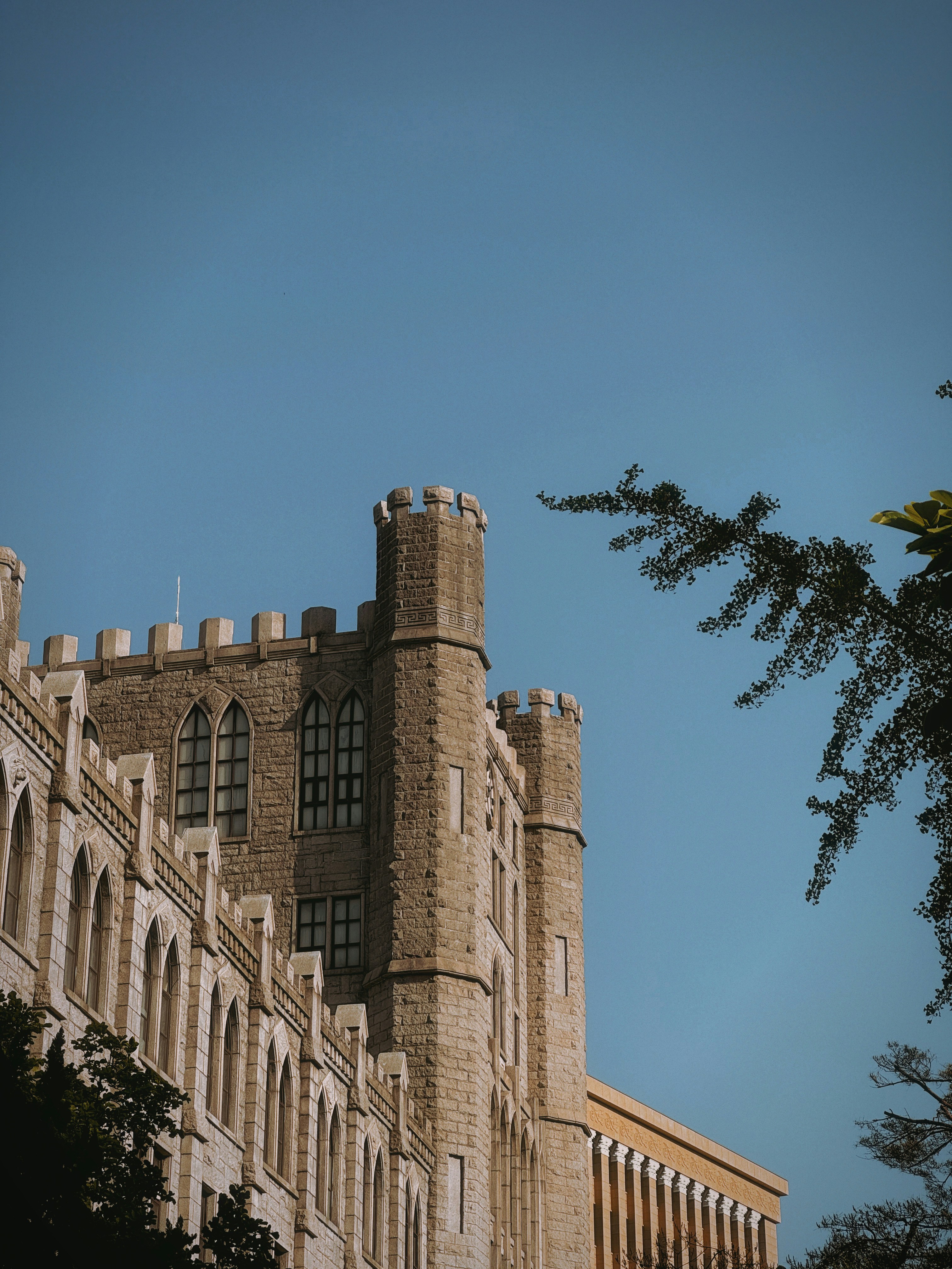 Castle Corner: Stone Turrets Reach Toward a Clear Sky