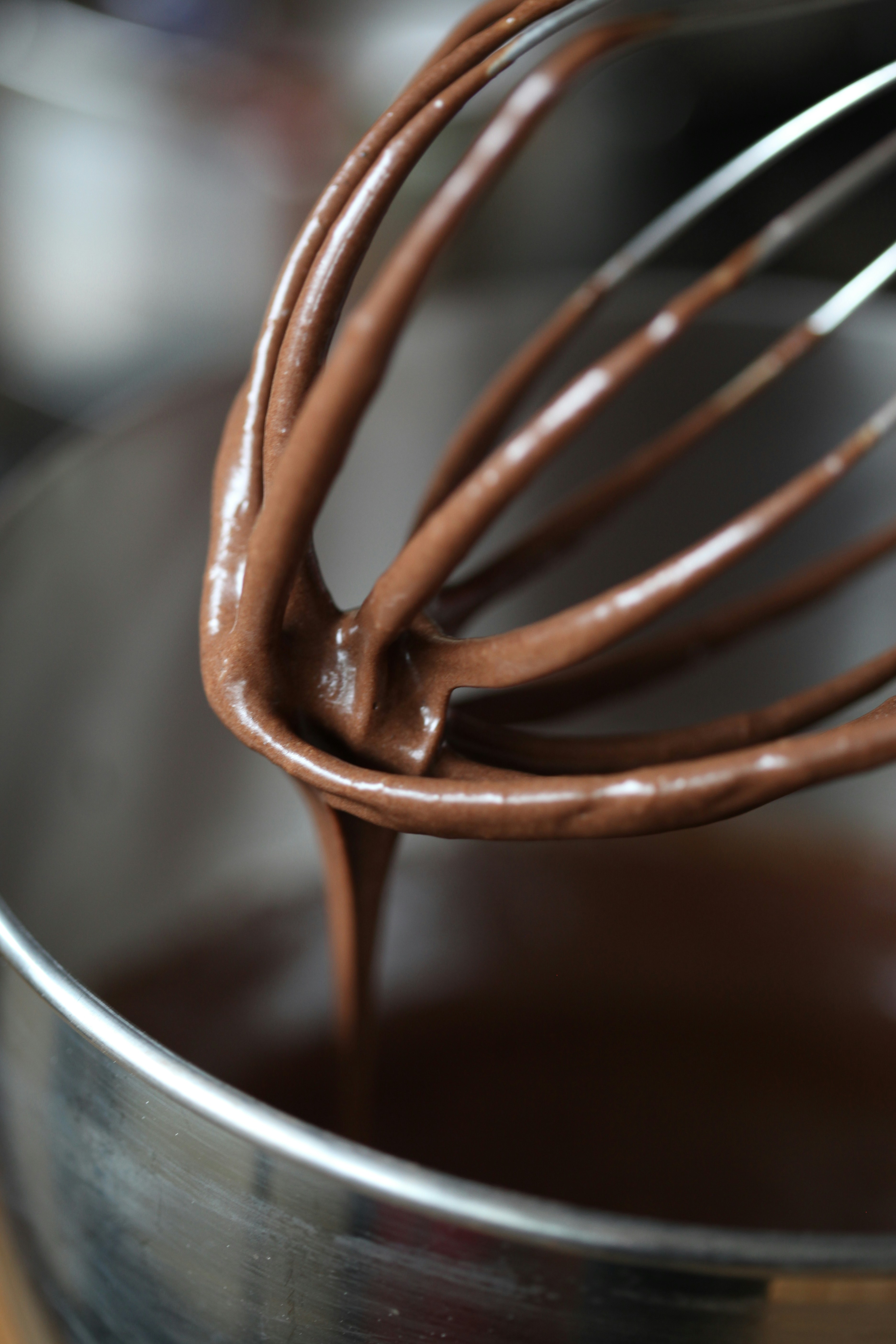 Chocolate Ribbon: Close-Up on a Whisk Taming a Bowl of Cocoa