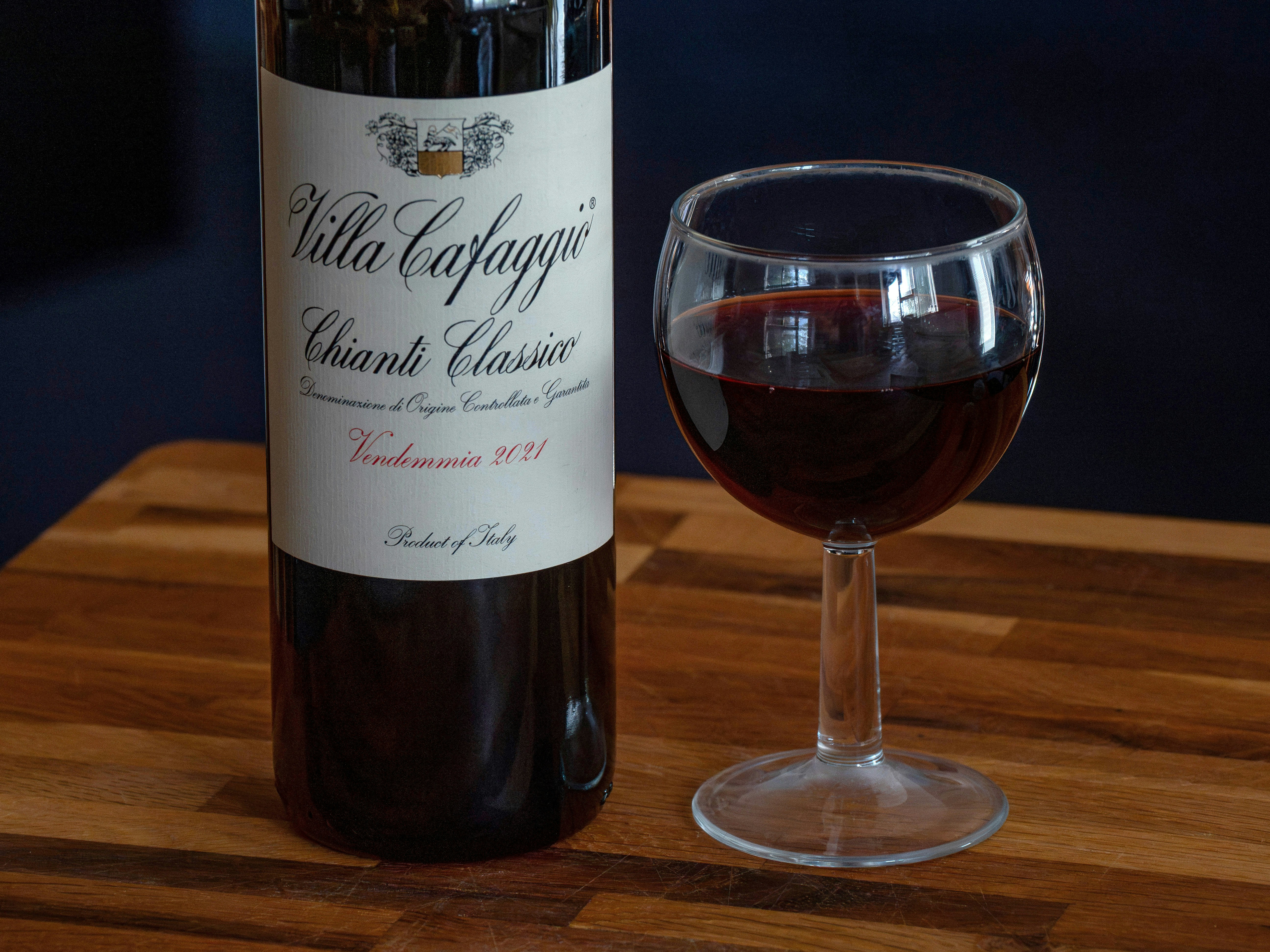 Wine and Wood: A Quiet Pour by the Striped Board