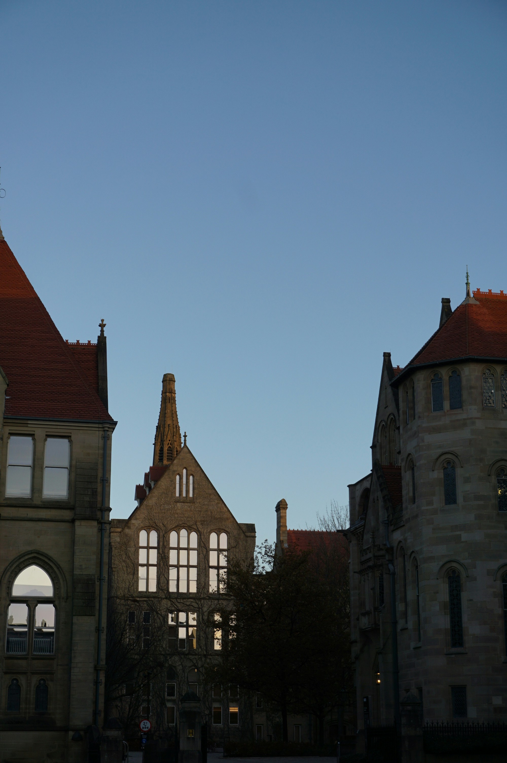Gothic Courtyard: Towers Framing a Quiet Sky
