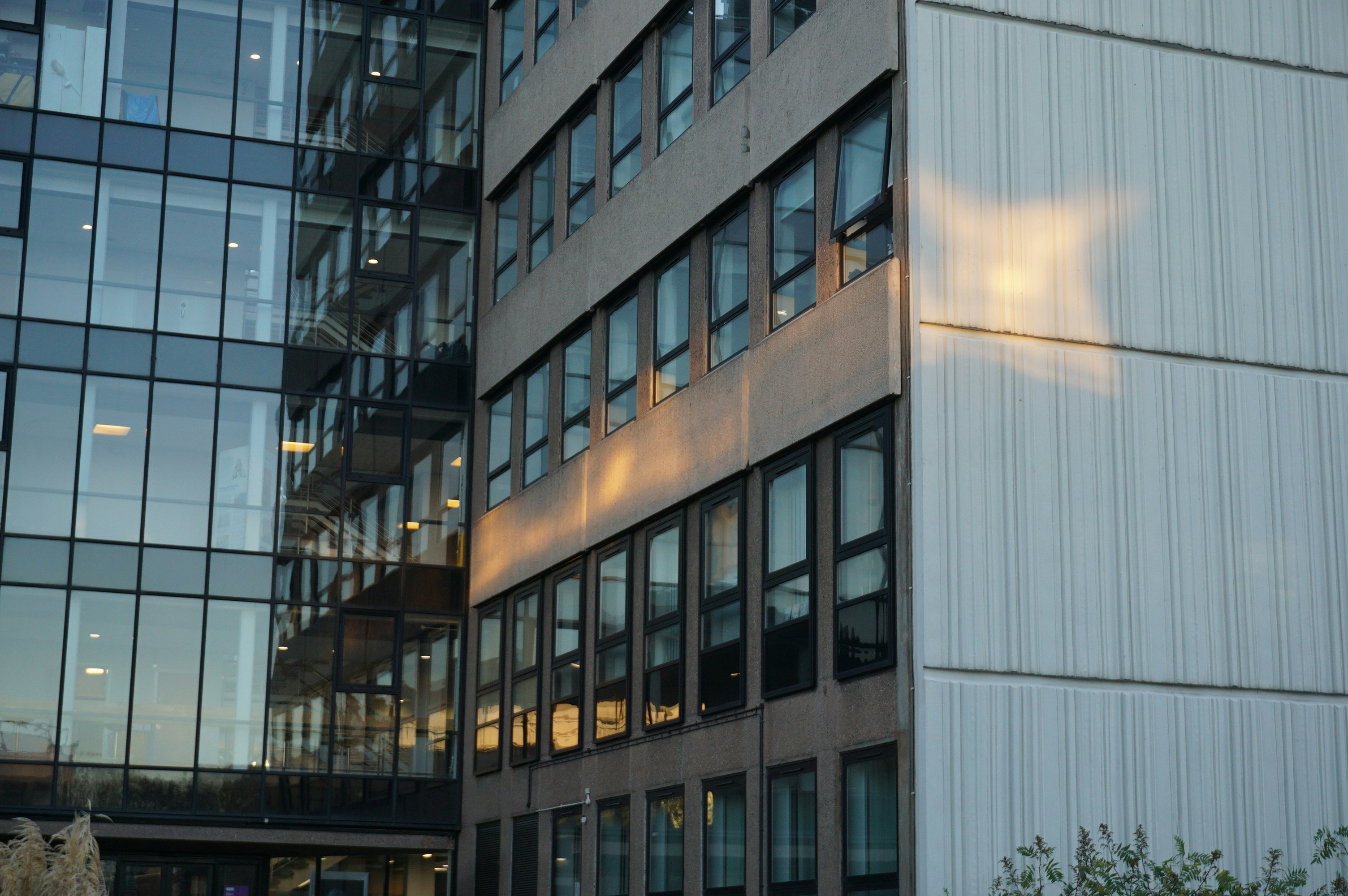 Glass-Backlit Geometry: Reflections on a Modern Facade