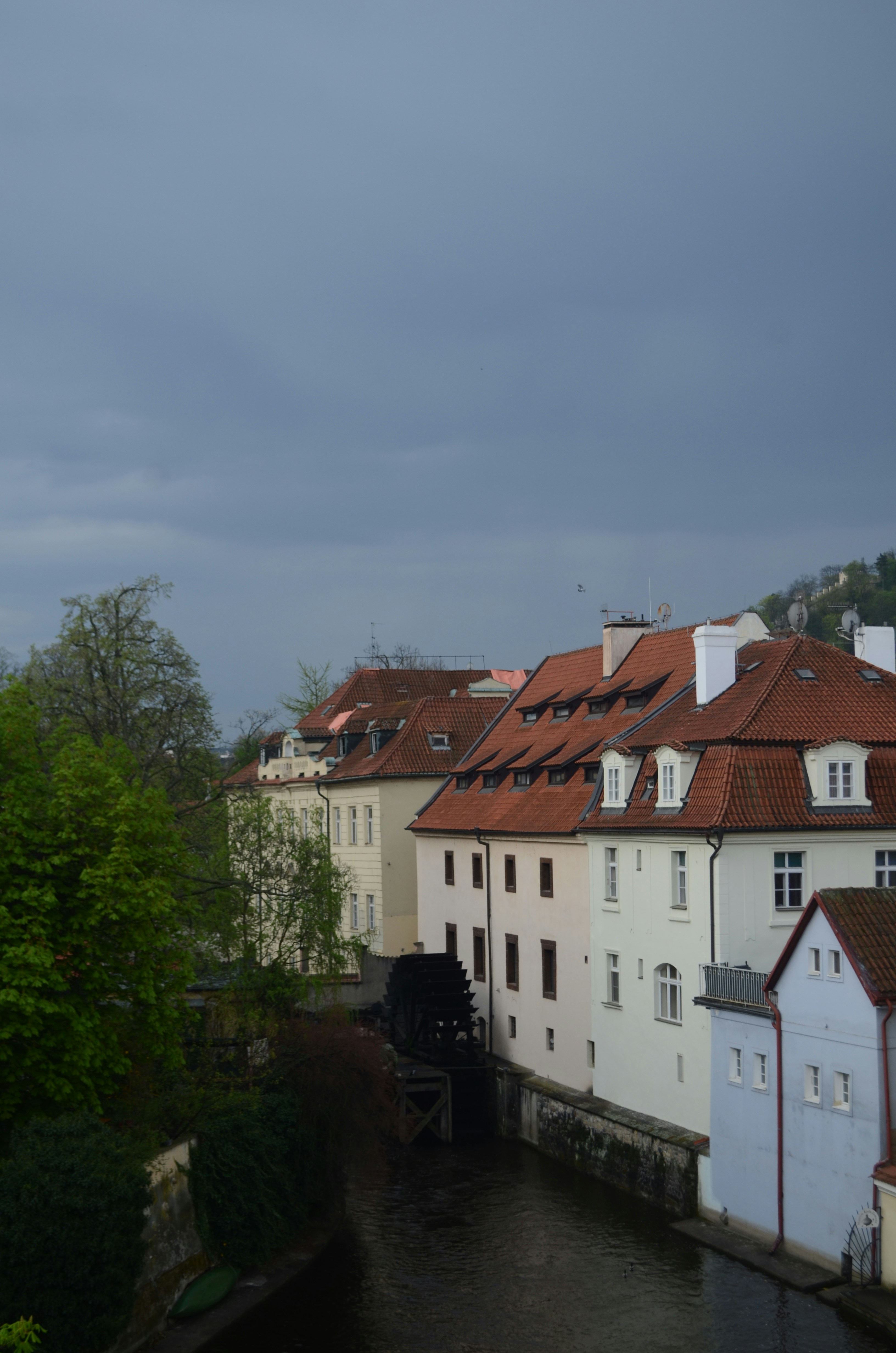 Waterway Through a Town of Red-Tiled Roofs