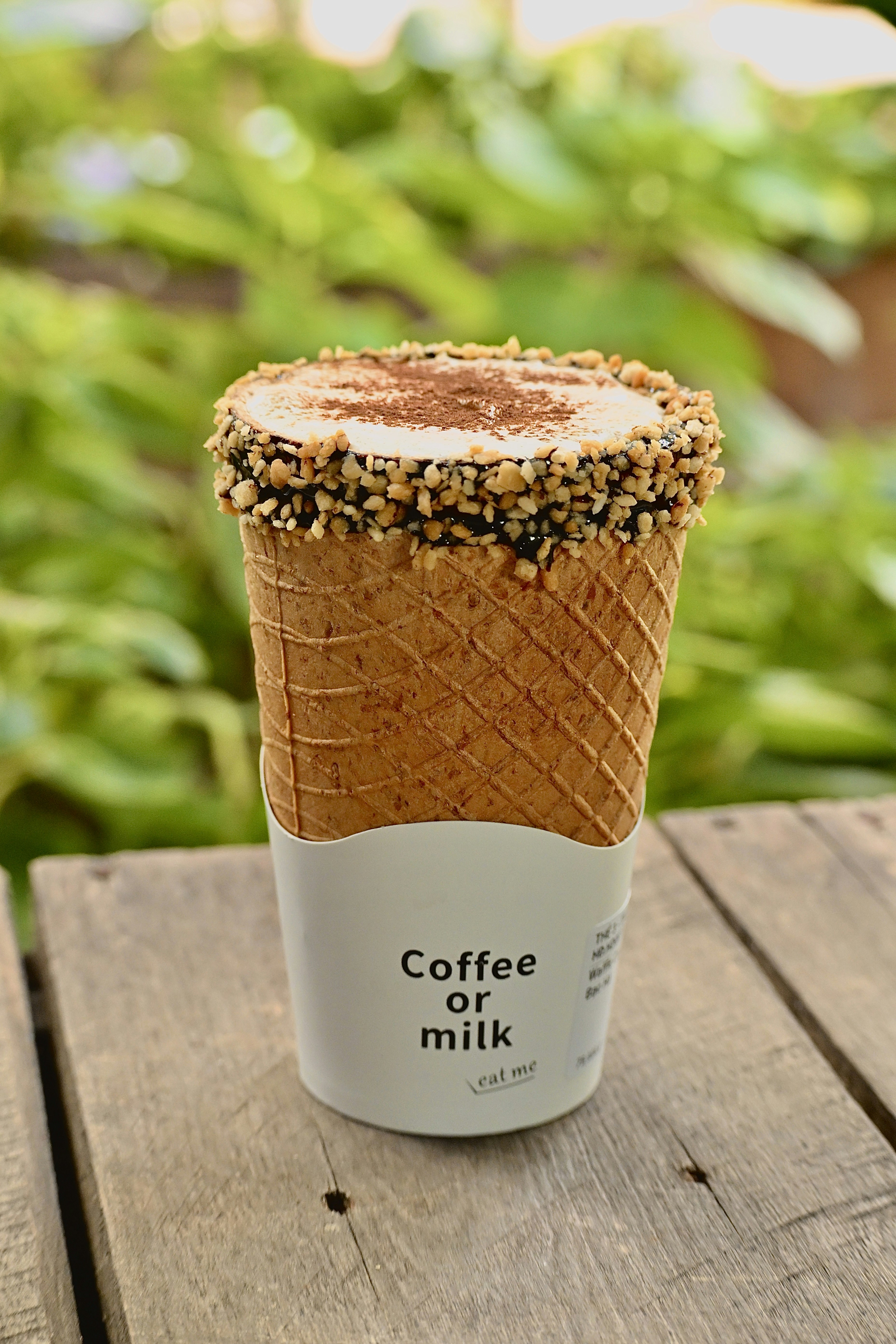 Cone of Focus: Nut-Crusted Vanilla Ice Cream on a Wooden Table