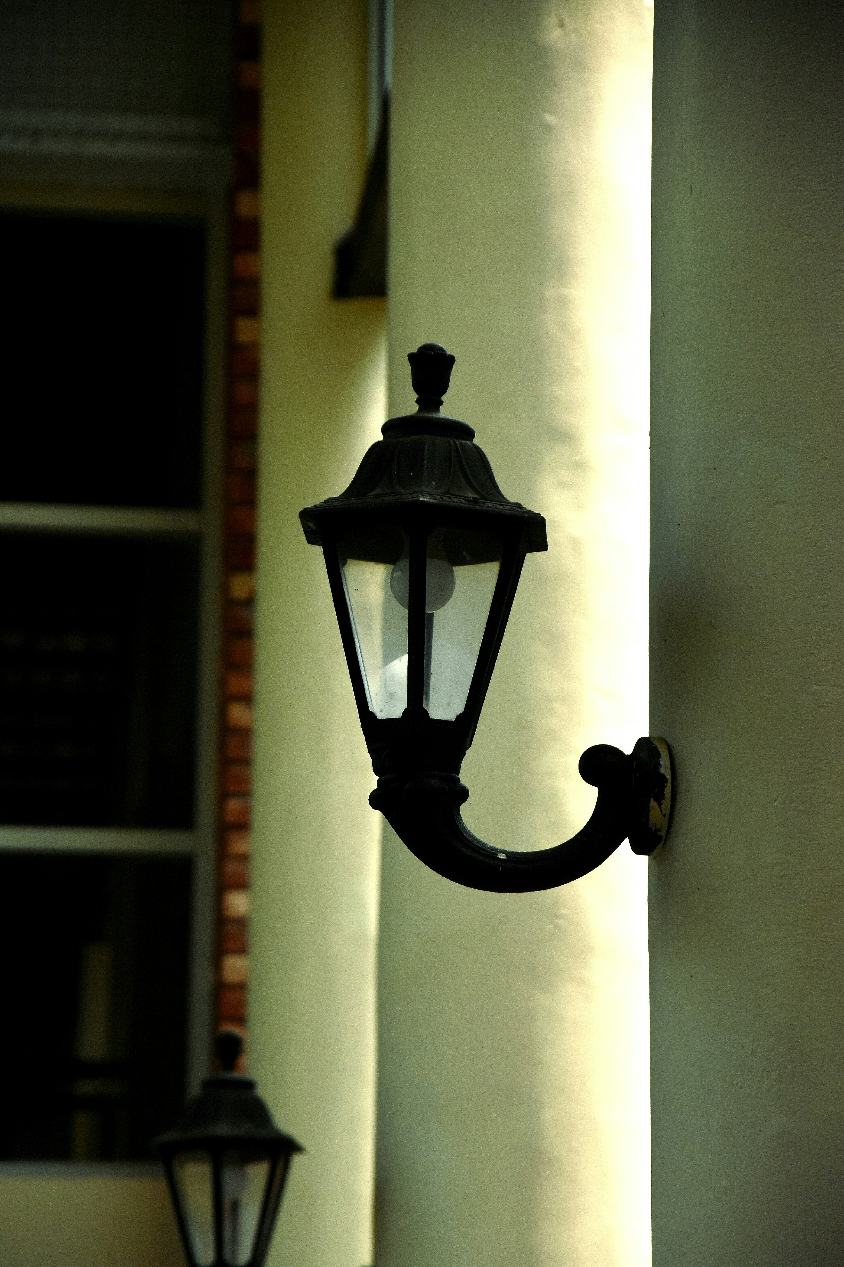 Edge of Light: A Nostalgic Lantern on a Quiet Terrace