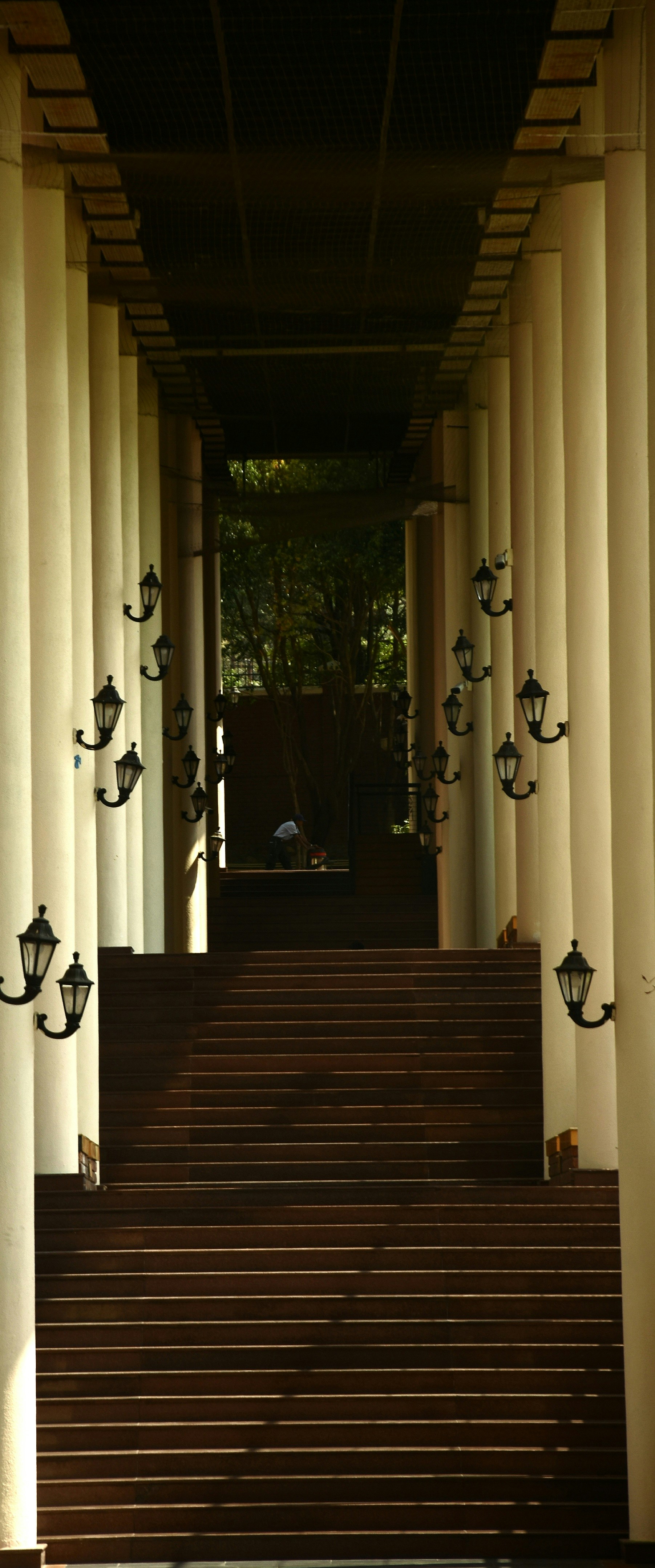Stairwell Archways: A Corridor of Light and Shadows