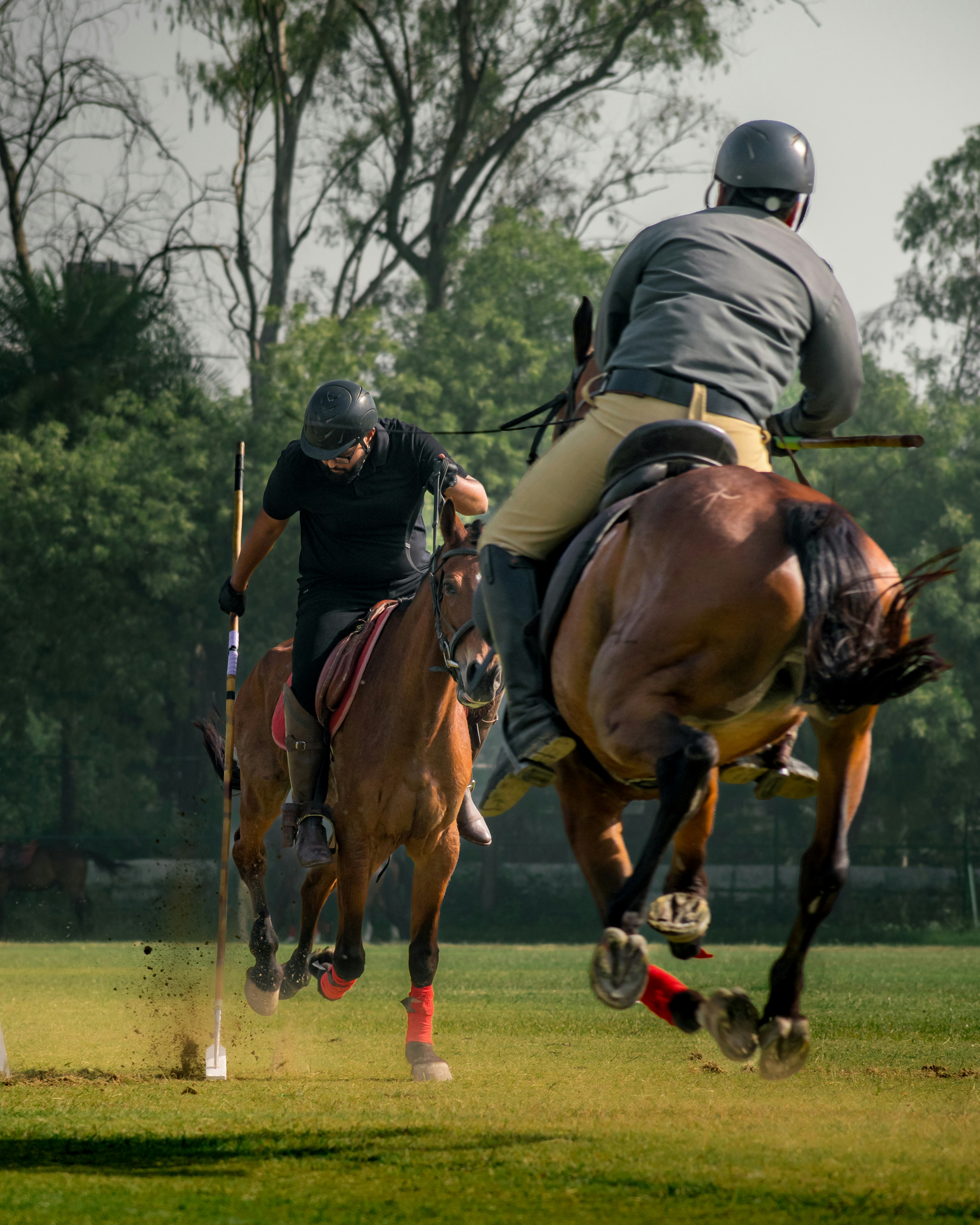 Mid-Field Rally: Riders Charge Forward on the Polo Field