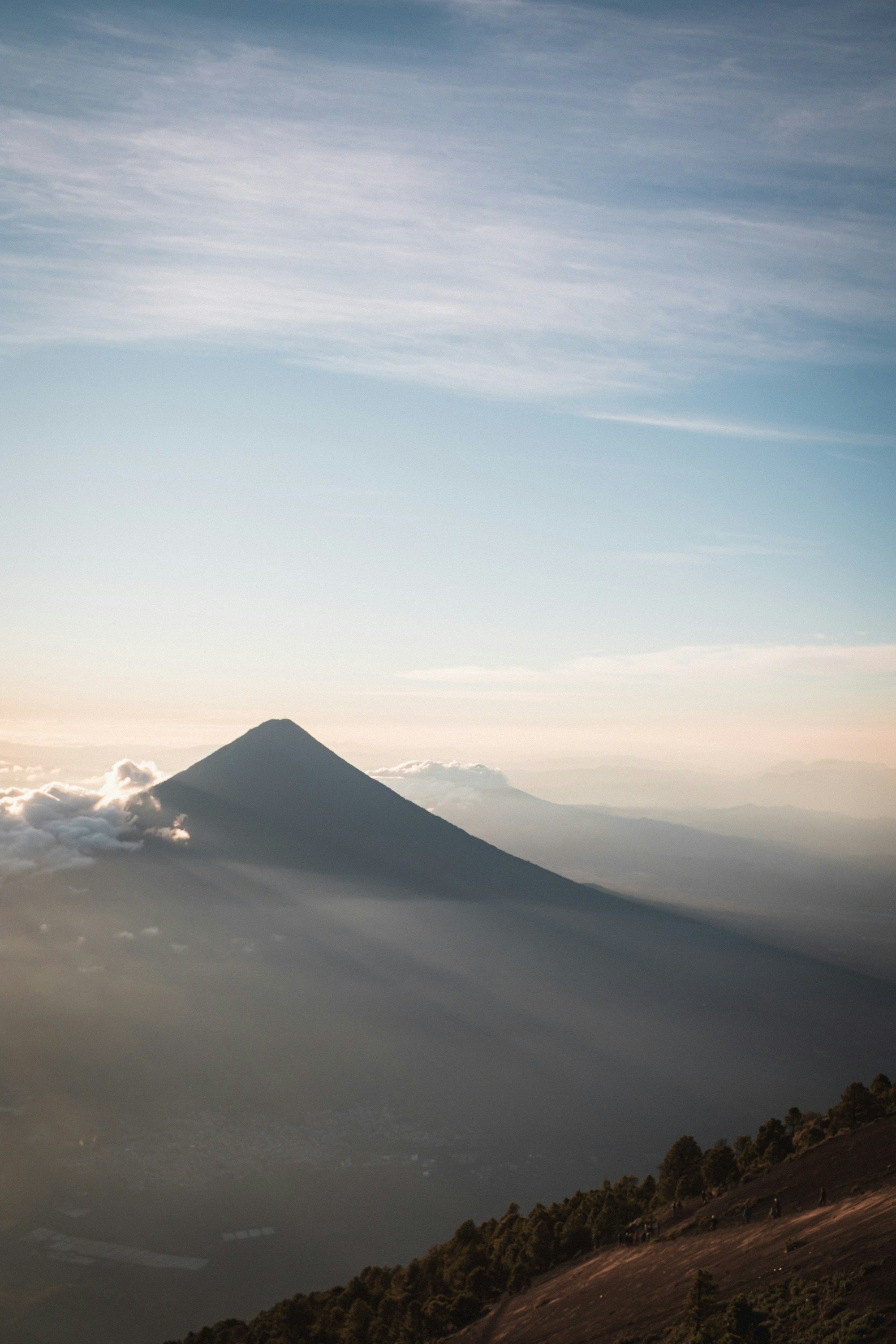 Dawn Crown: A Volcanic Ridge Veiled in Mist