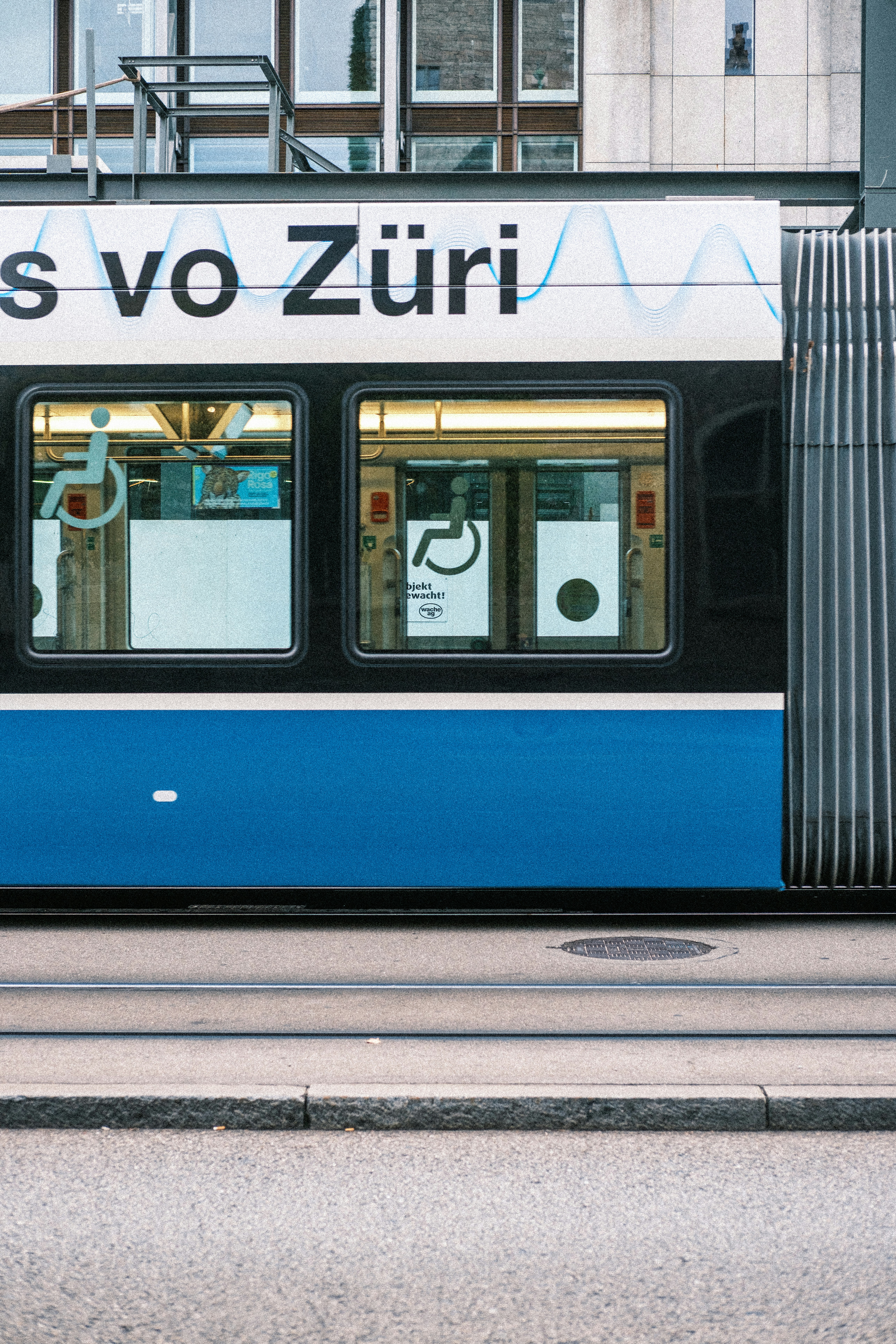 Transit Line at Zurich: A Tranquil Moment Behind the Windows