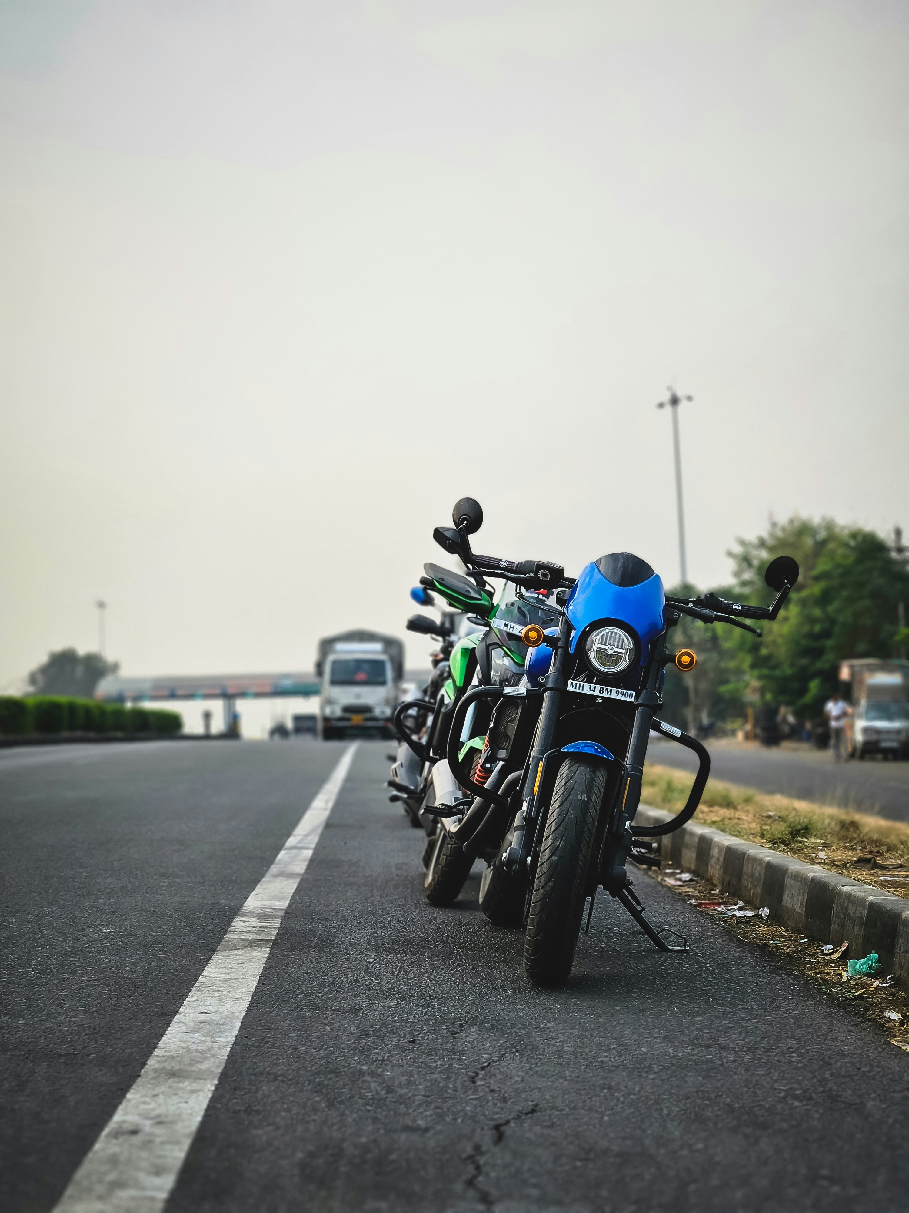 Blue-fronted Street Runners: A Row of Motorcycles Piercing the Horizon