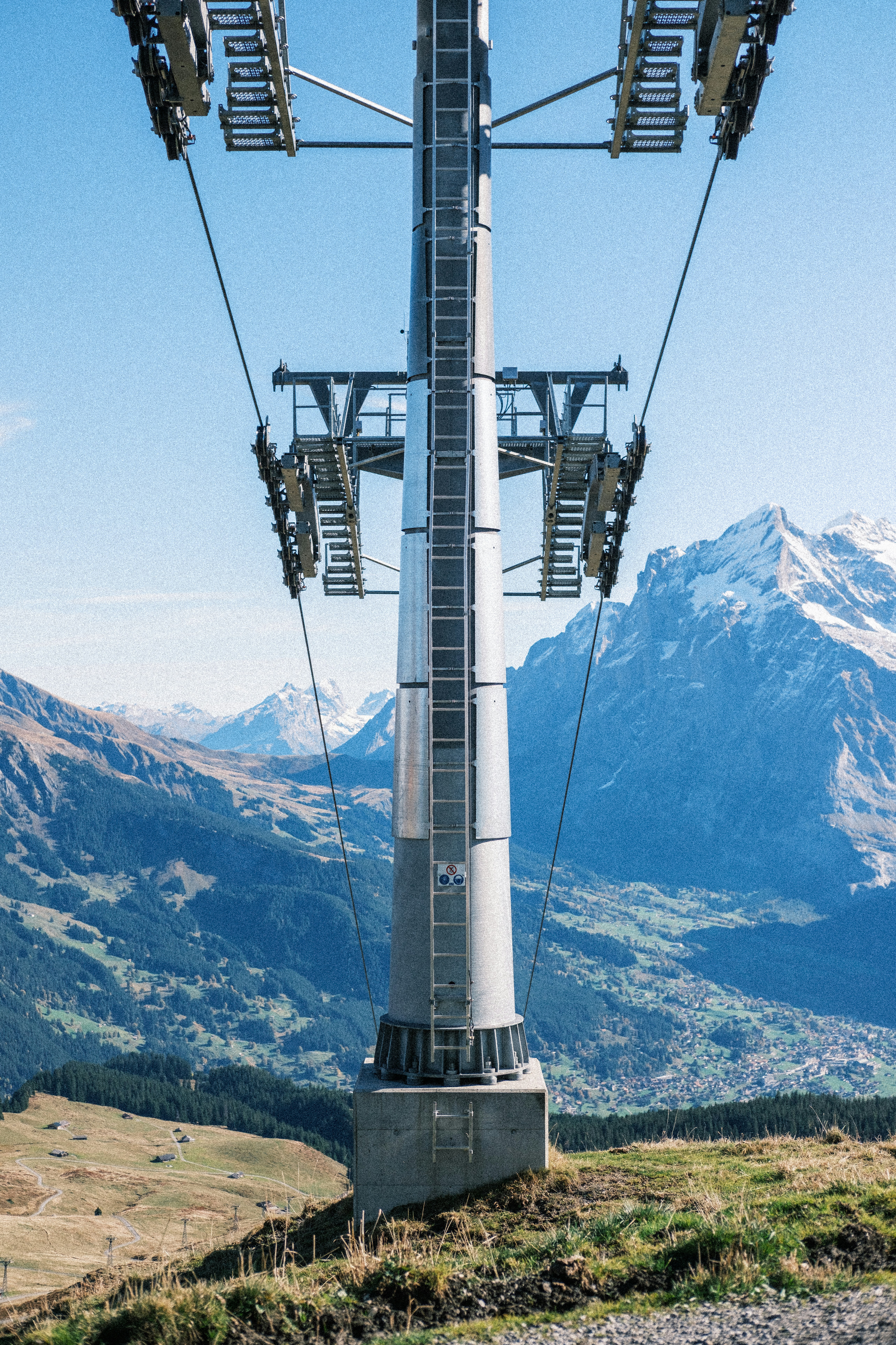 Lift Toward the Sky: A Mountain Cable Car Structure Framed by Alpine Peaks