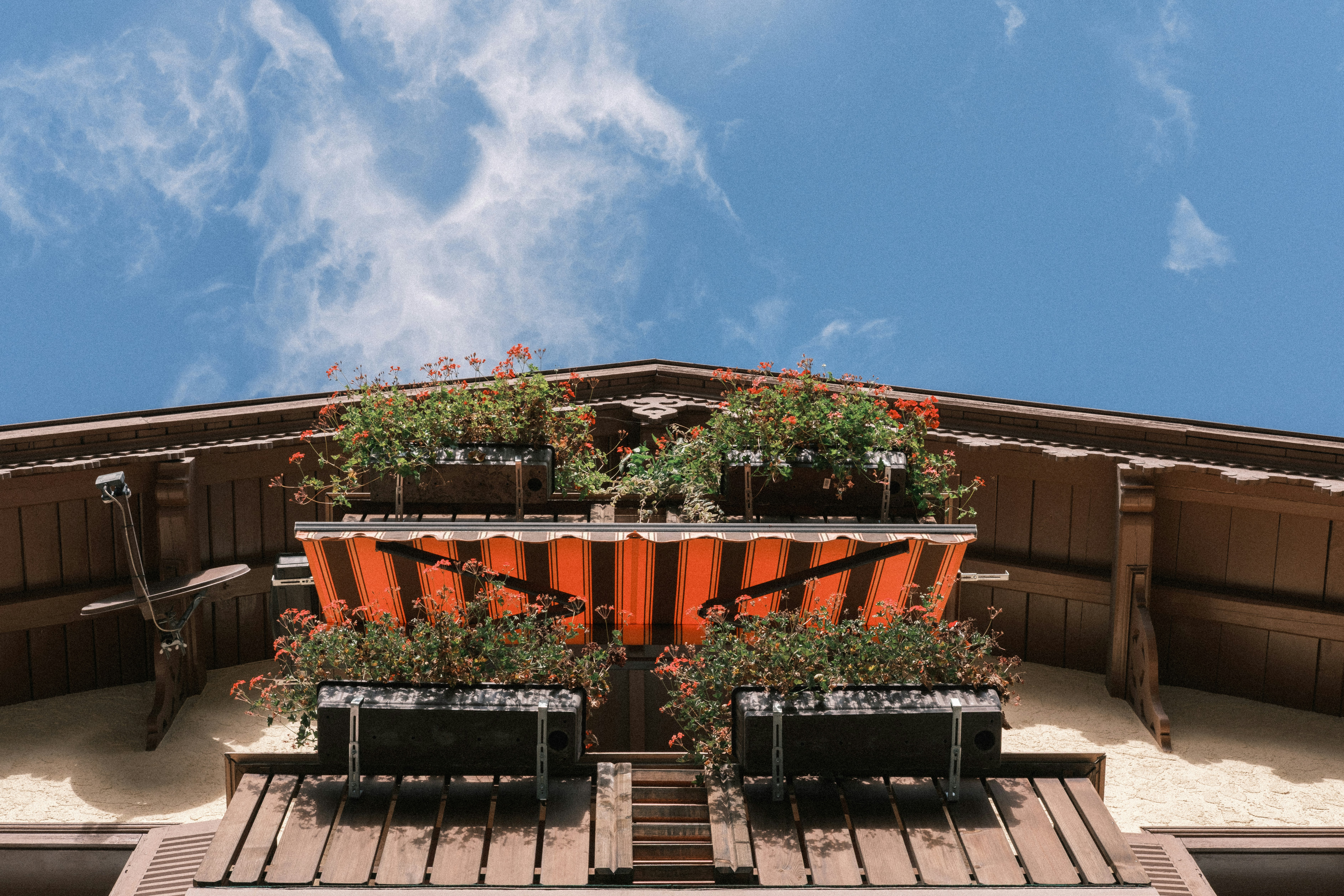 Rocking Balcony Garden Above the Timber Facade