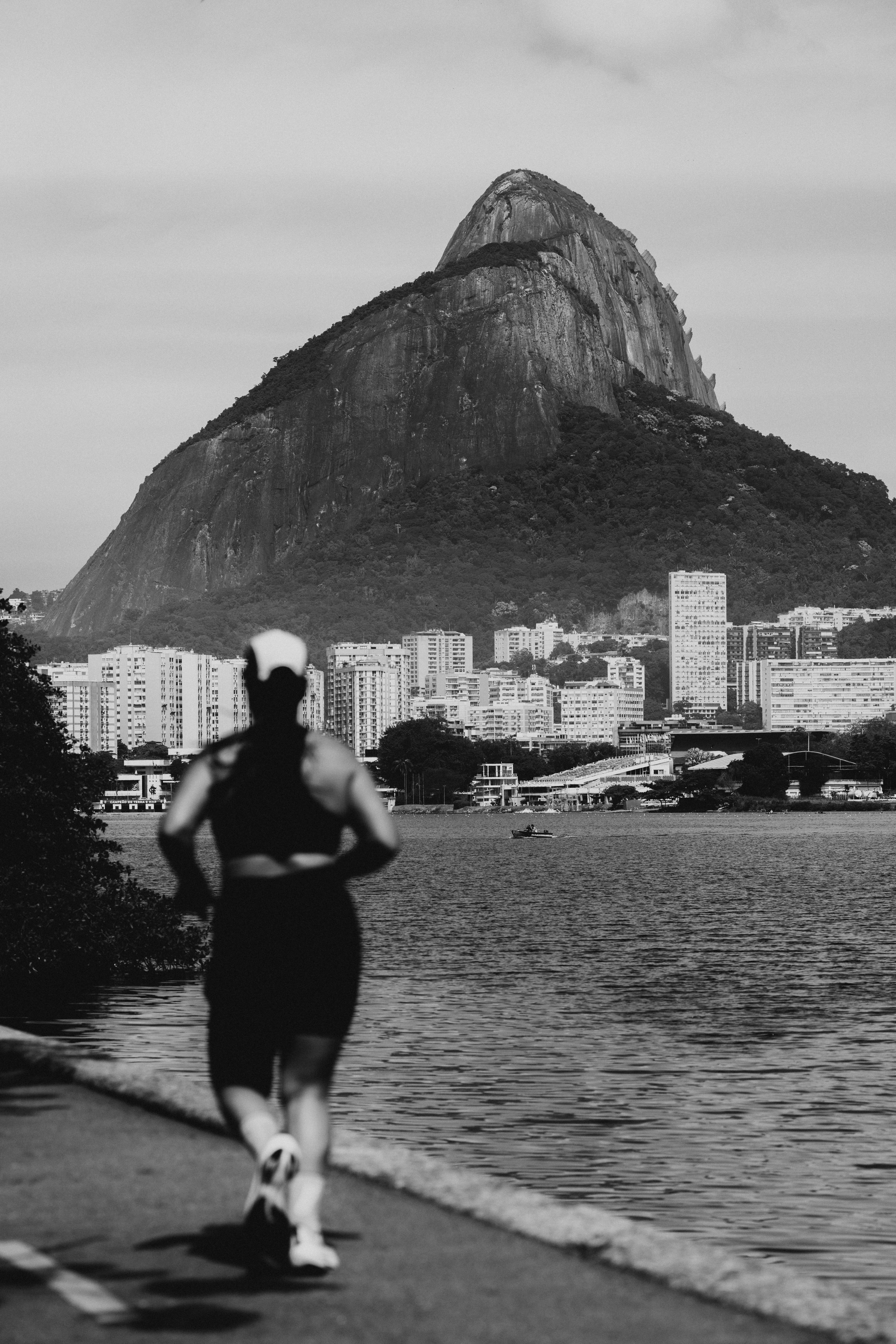 Runner on the Seafront, Backdropped by Sugarloaf Mountain