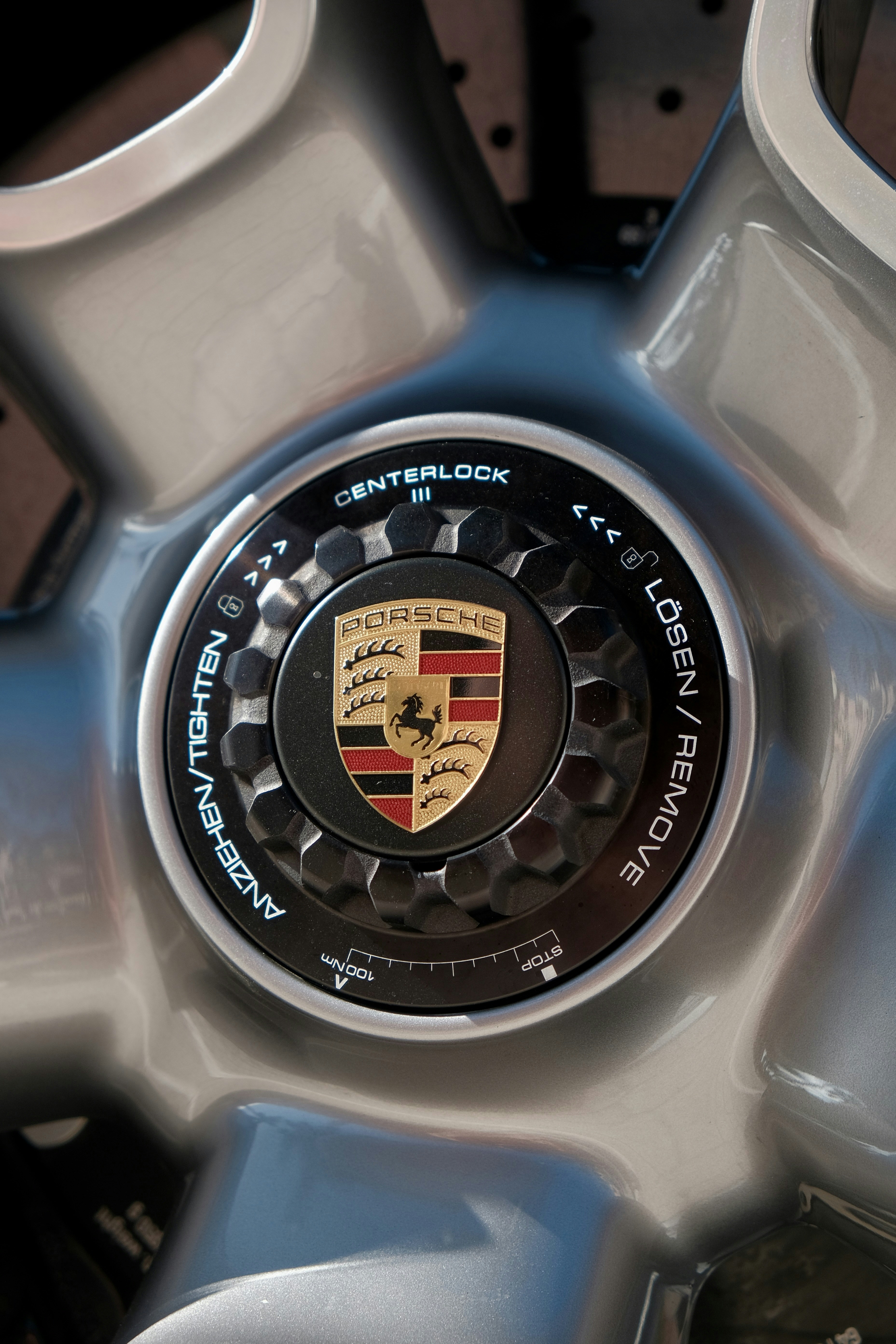 Porsche Crest at the Core: A Close-Up on the Wheel Center Cap