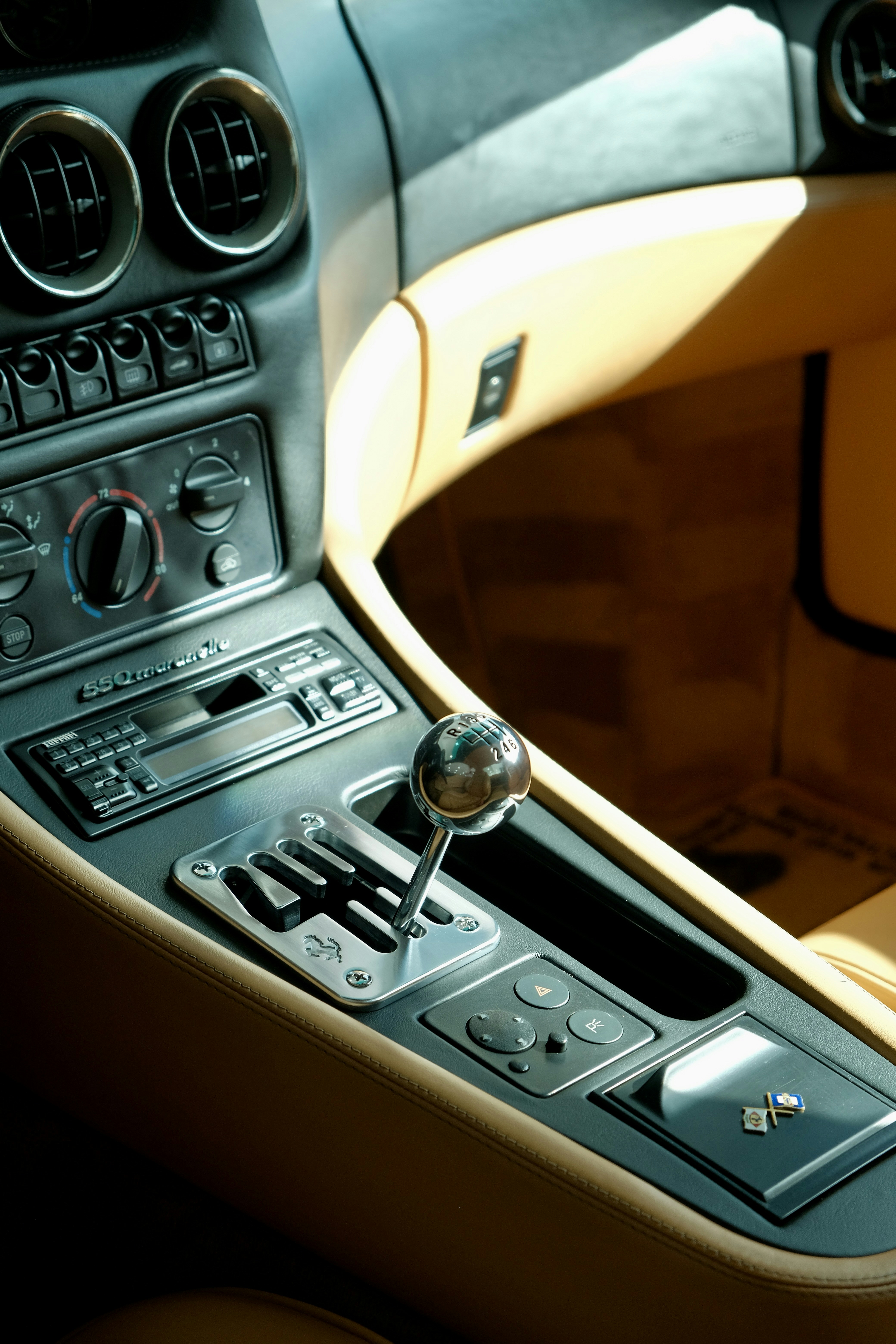 Sporty Precision: The Car’s Console as a Metallic Compass