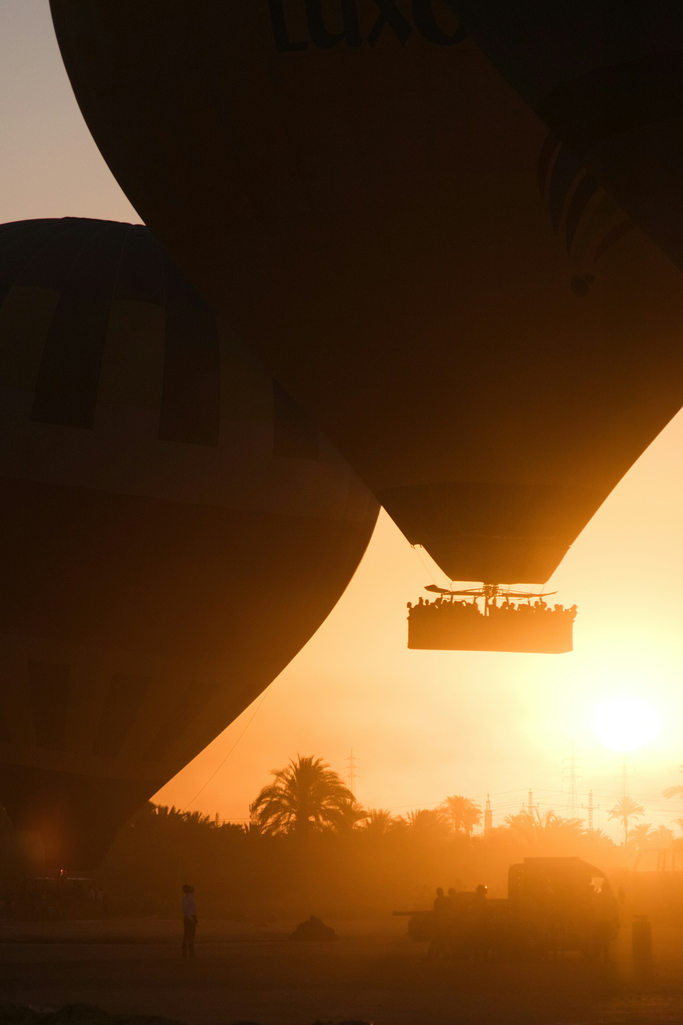 Sunrise in the Shadow: Aerial Baskets Against the Golden Dawn