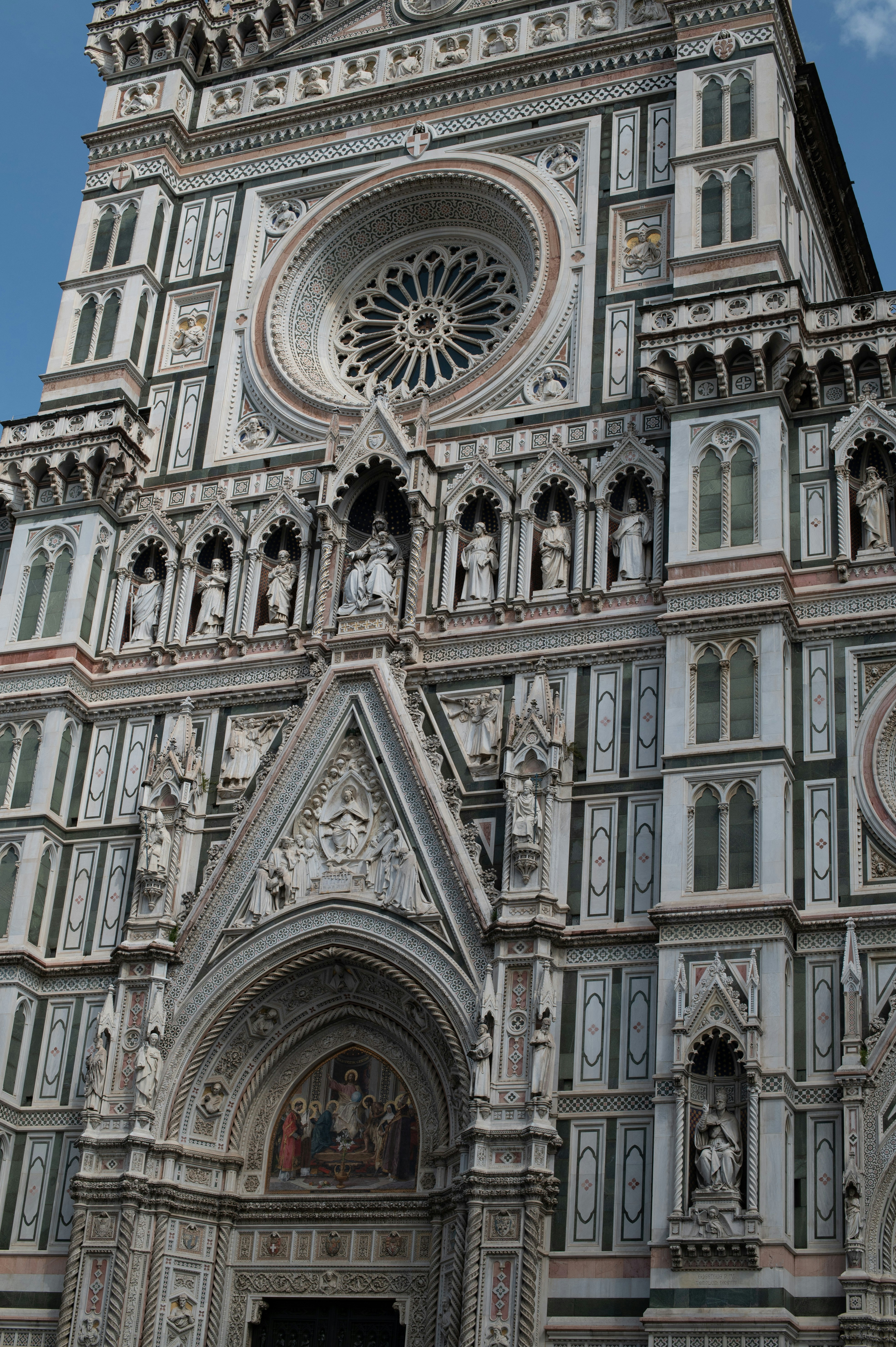 Ornate Portal of Stone: A Florentine Facade in Marble Whorls