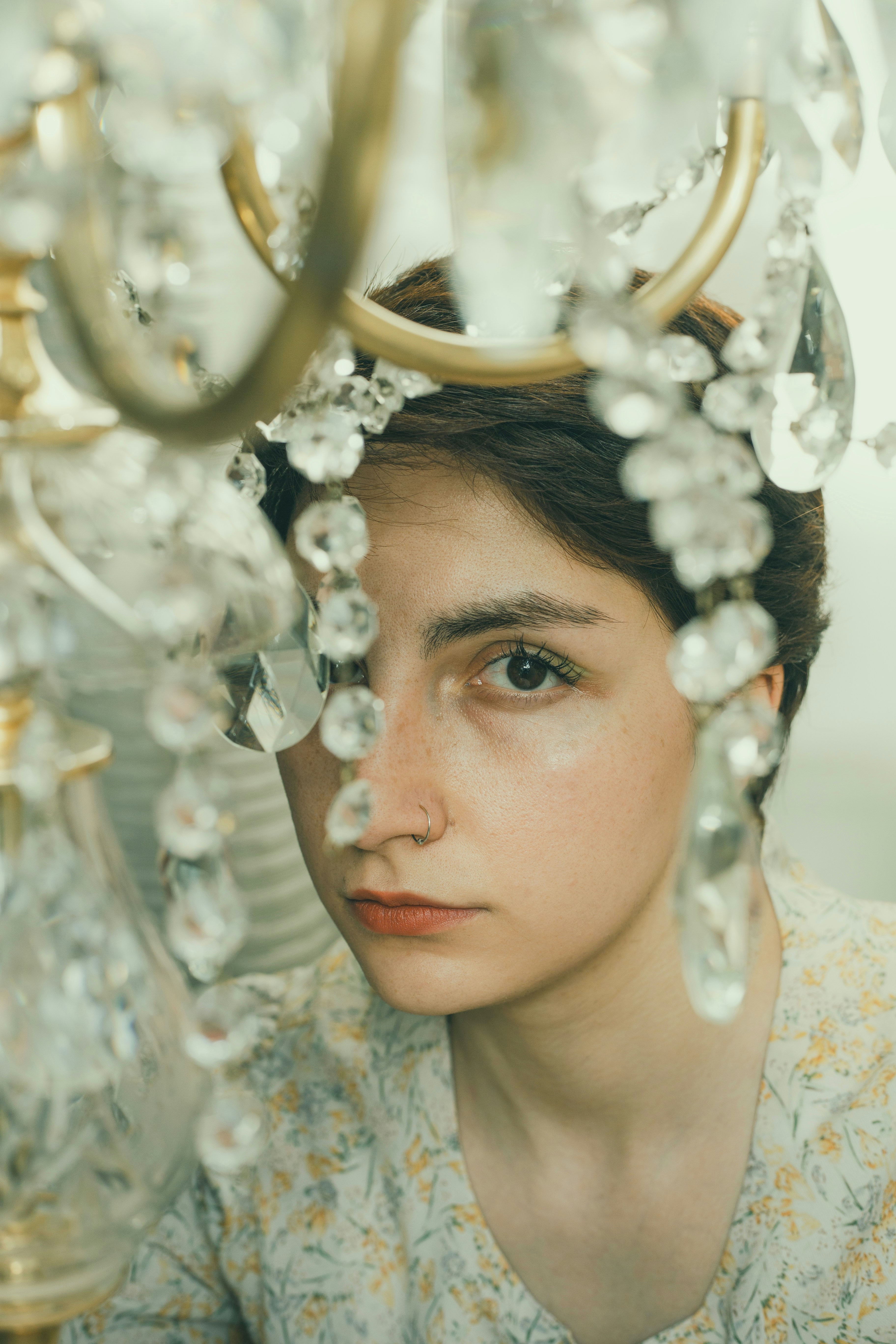 Framed Gaze Through Crystal Drapes