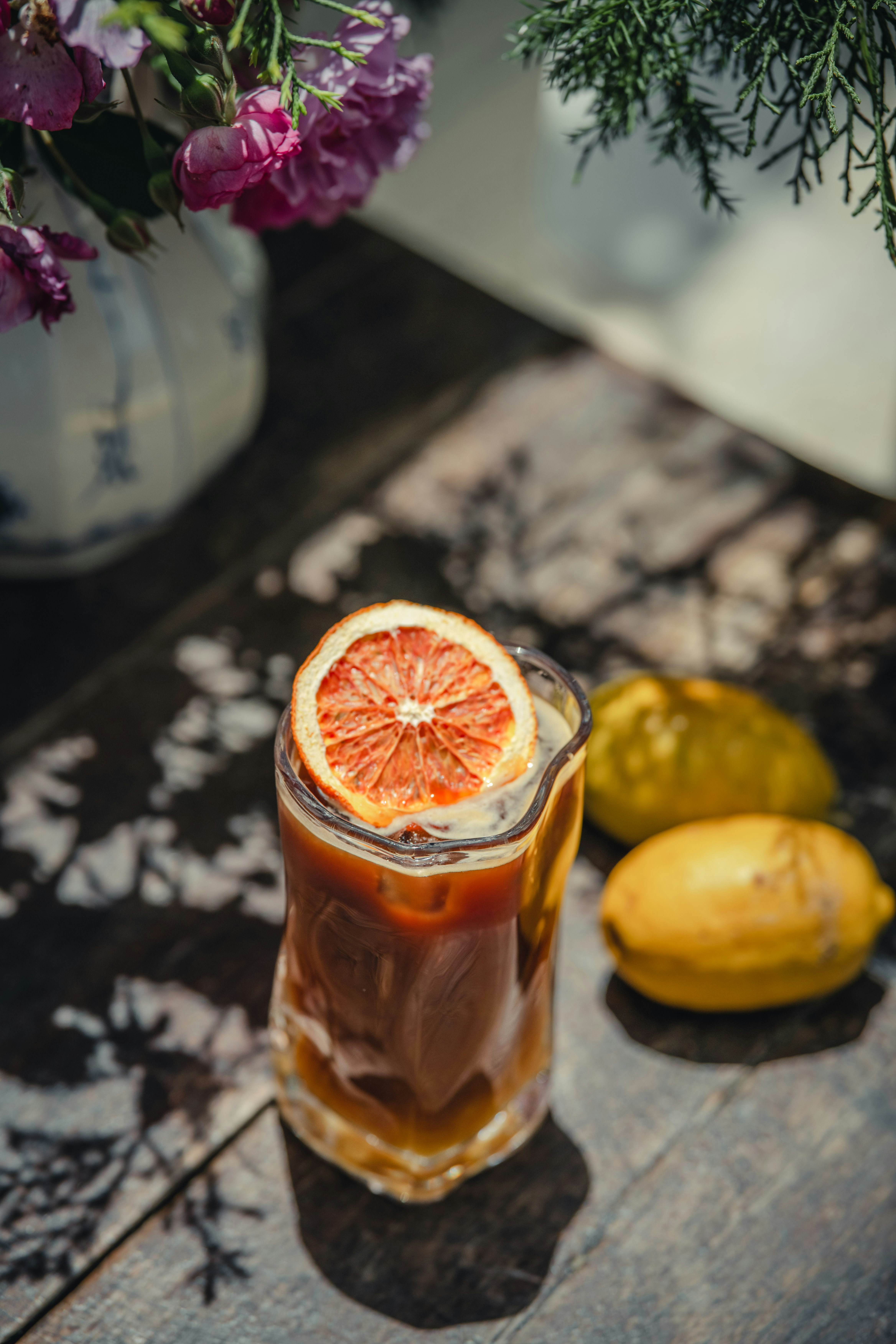 Citrus-iced Elixir on a Rustic Table