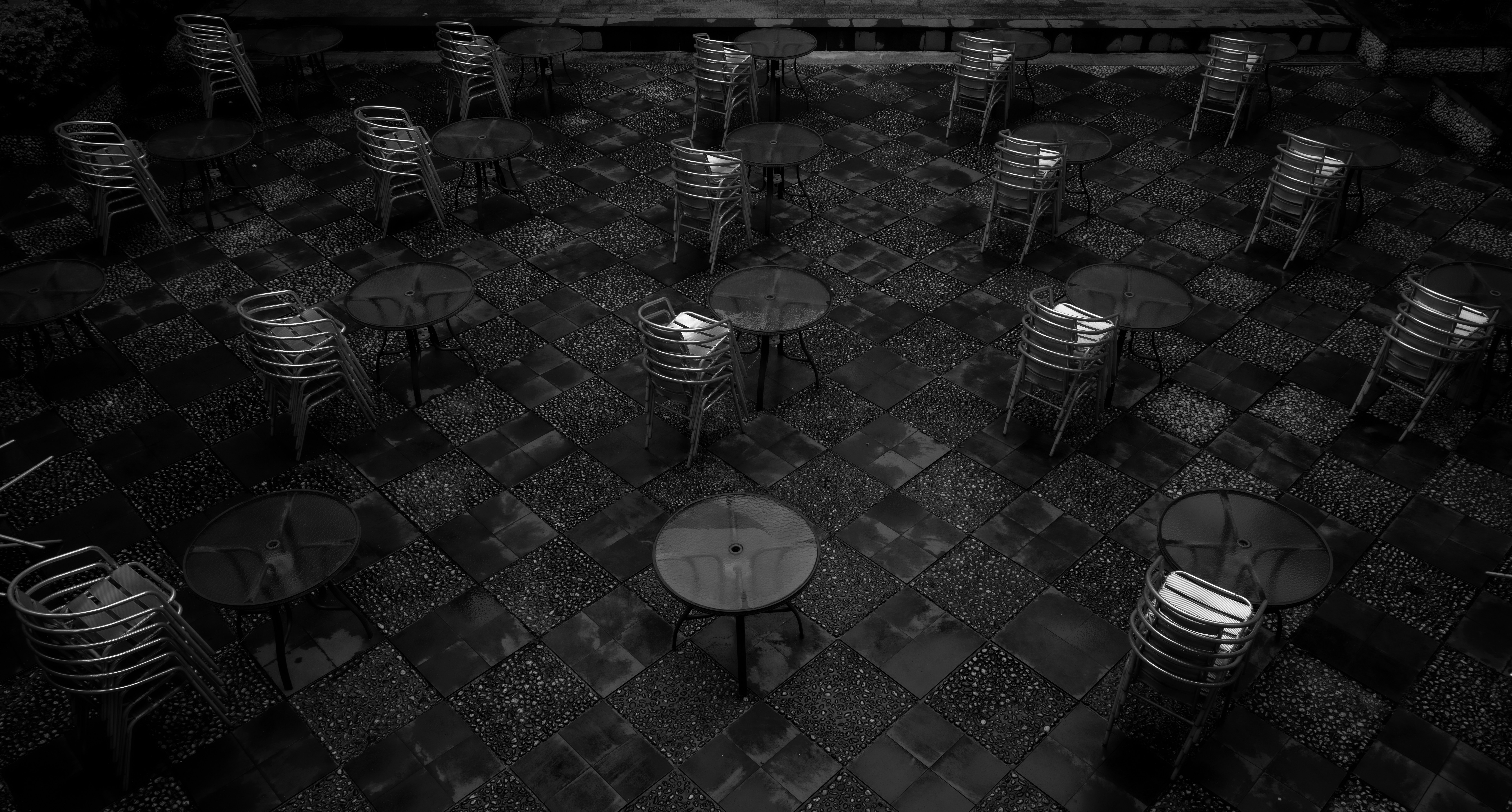 Lonely Round Tables in a Dimened Ballroom