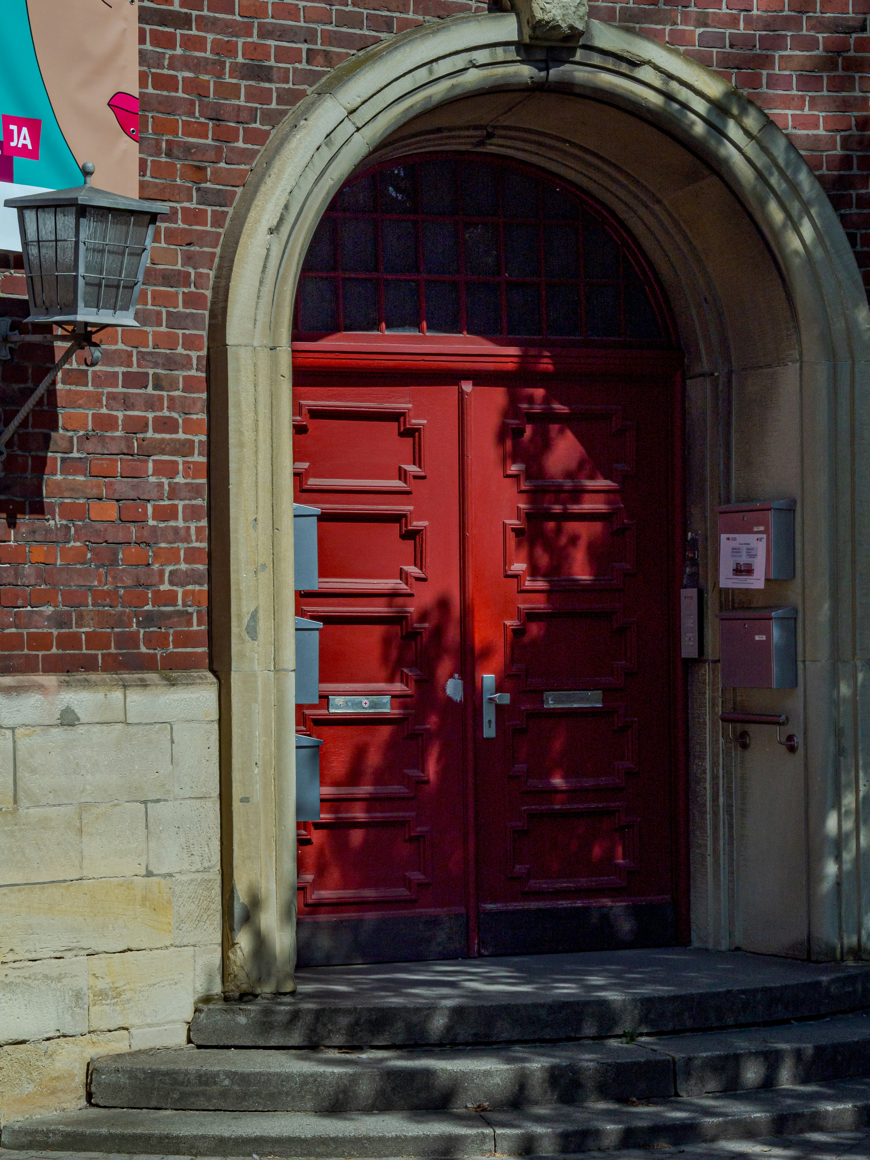 The Red Portal: A Historic Door Set in Brick and Stone