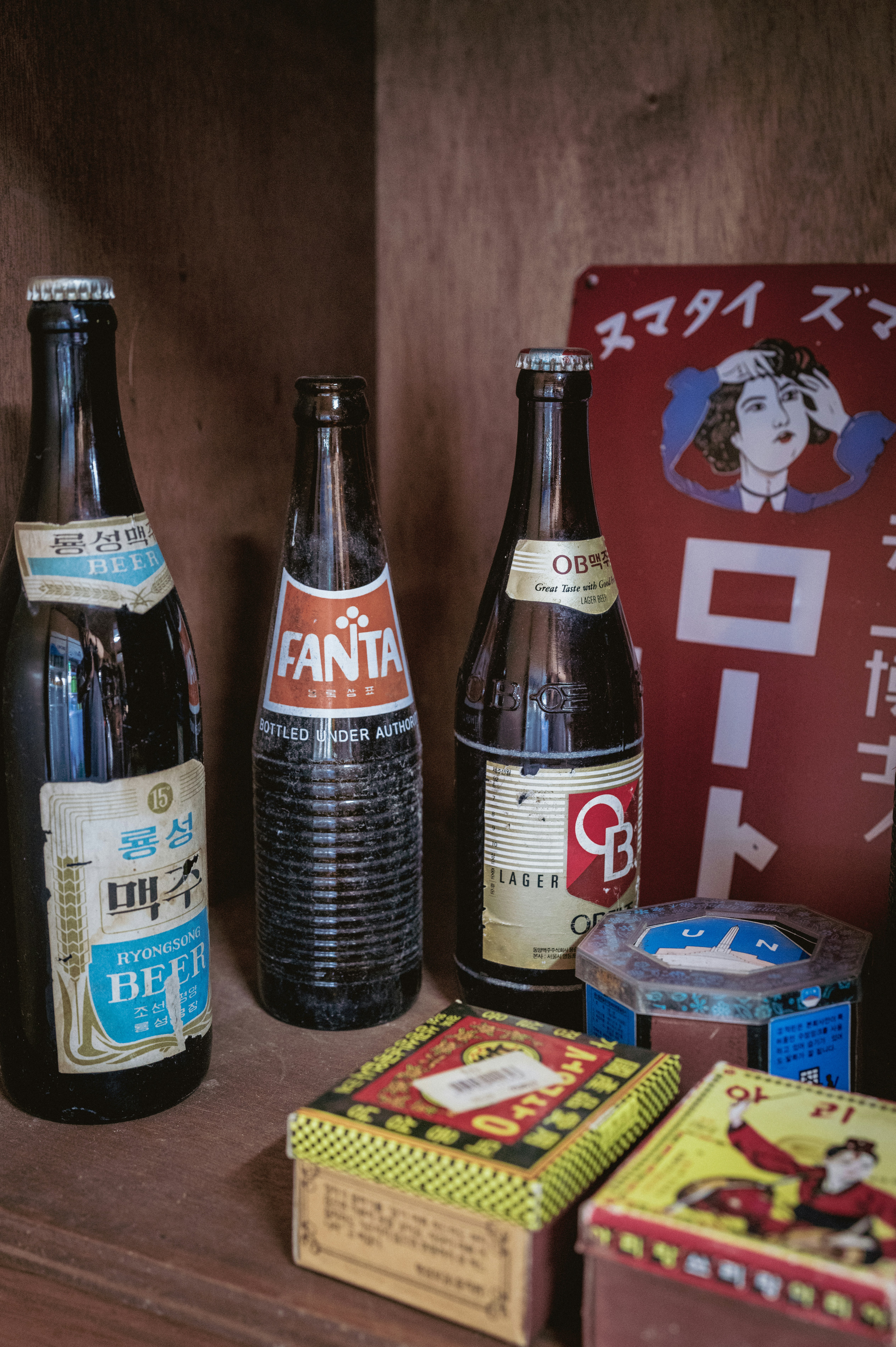 Old-World Soda Shop: Bottles and Boxes in a Quiet Shelf