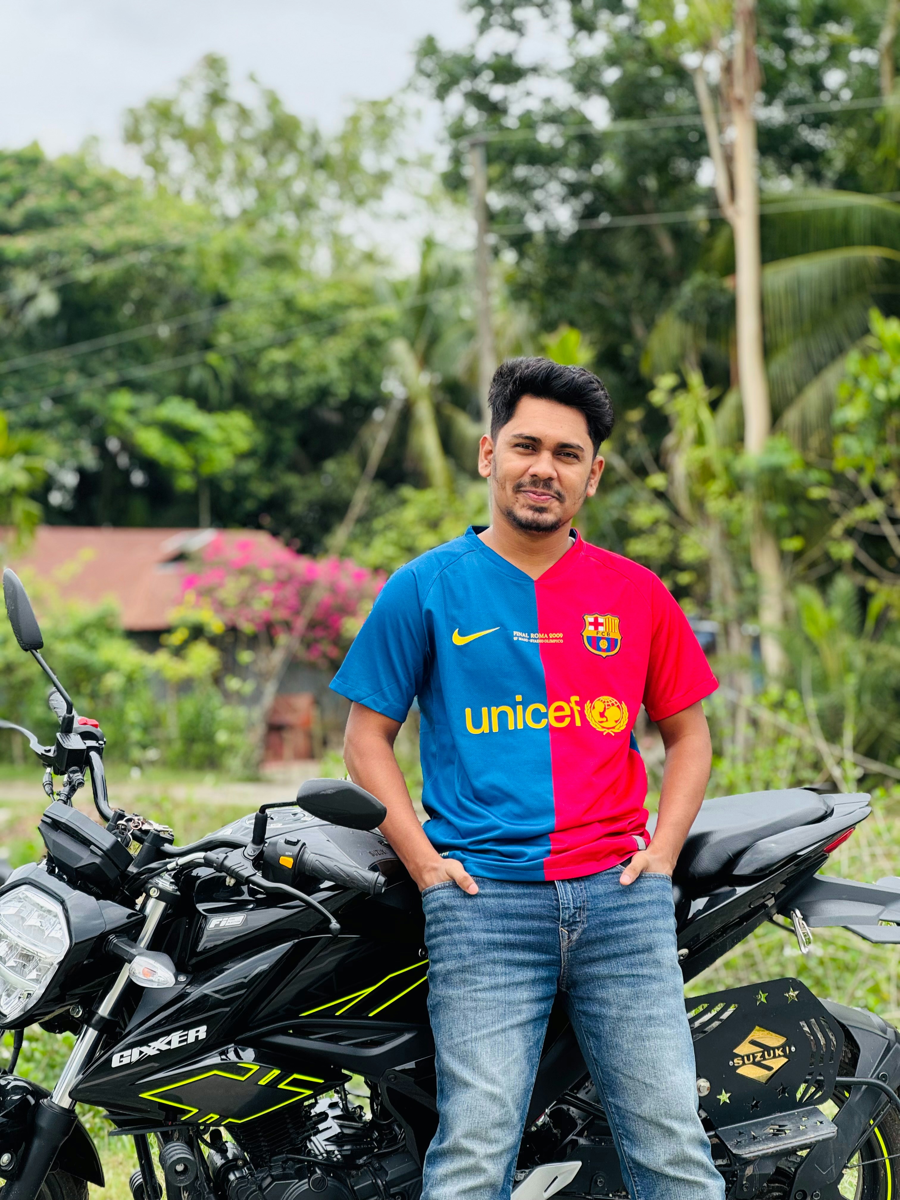 Colorful FC Fan in a Split-Color Jersey Poses Beside a Bike
