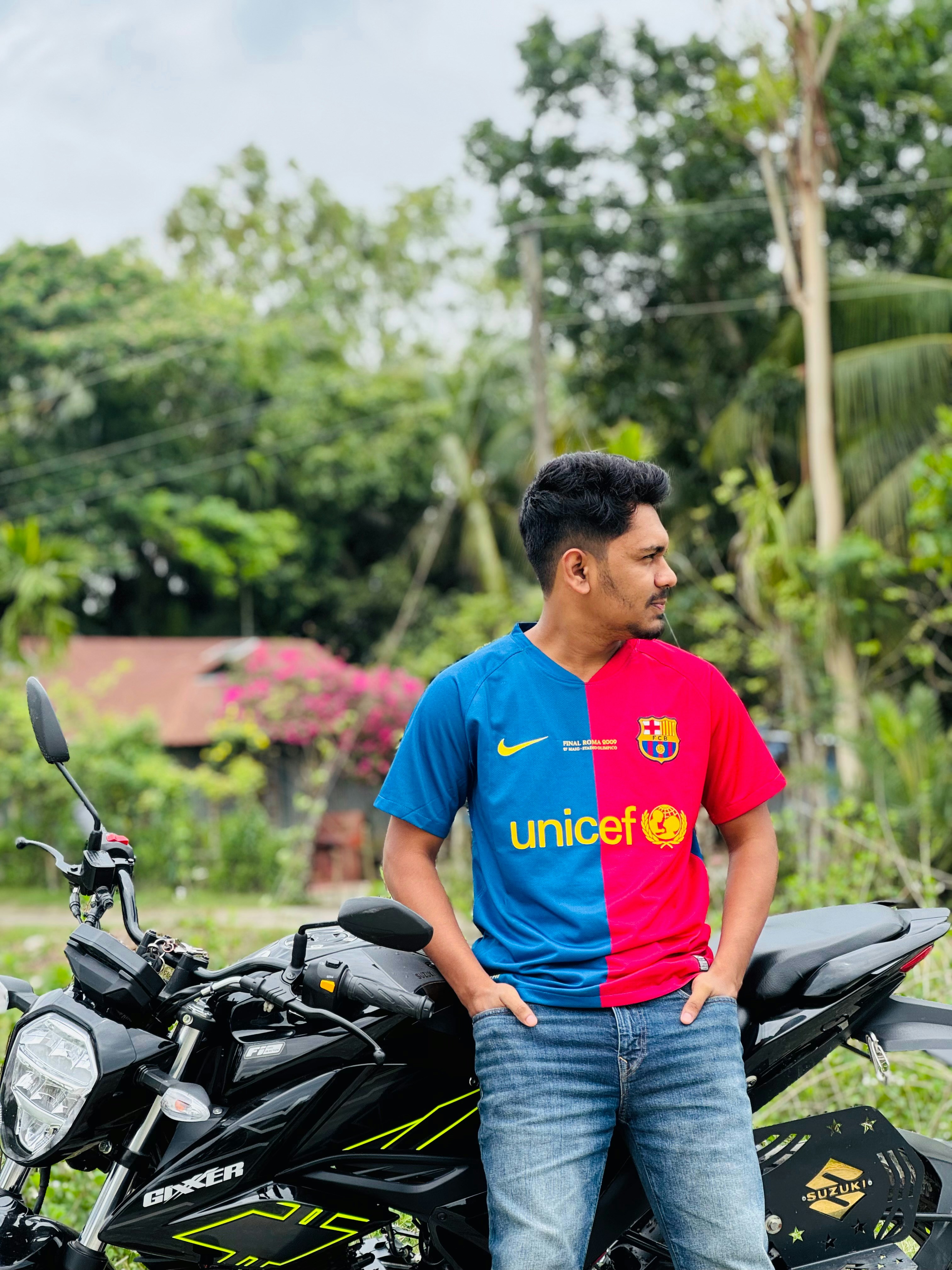 Vibrant Manchester United fan beside a sleek street-bike