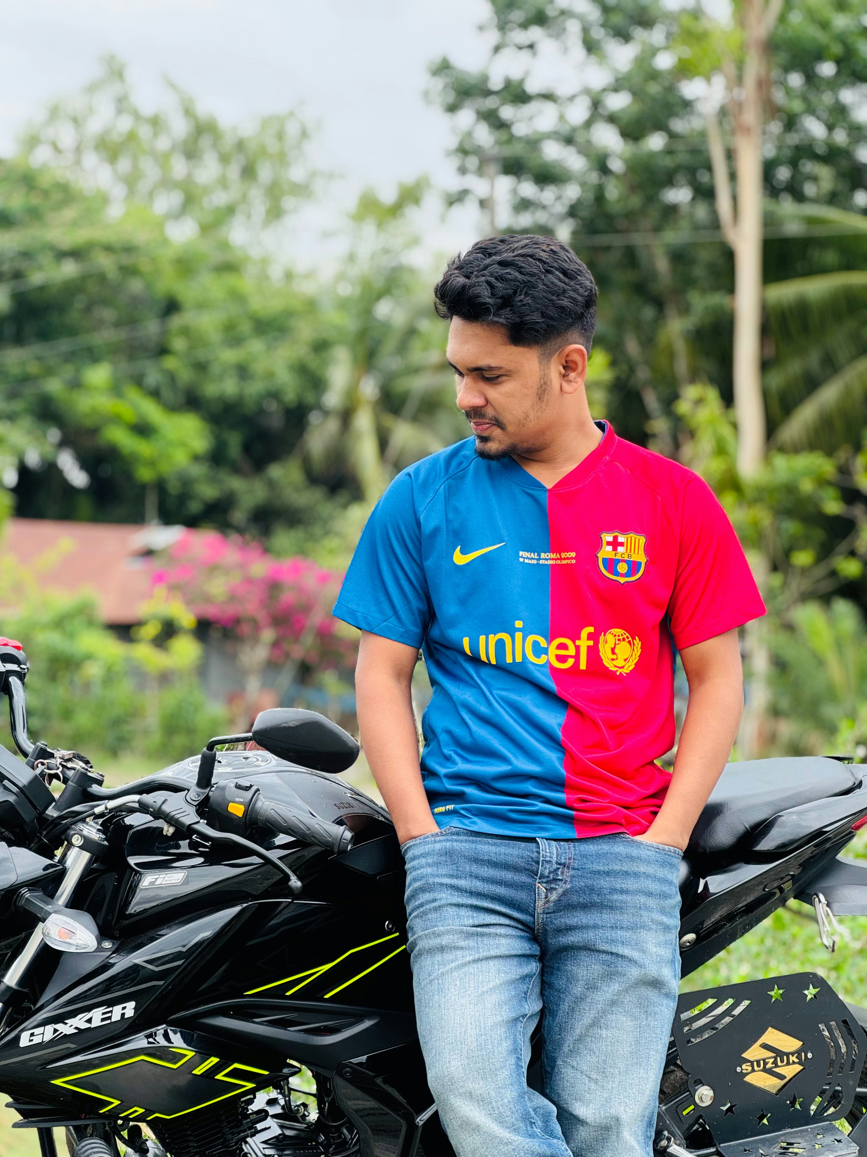 Color-Block Portrait: A Man in FC Barcelona Jersey by a Motorcycle
