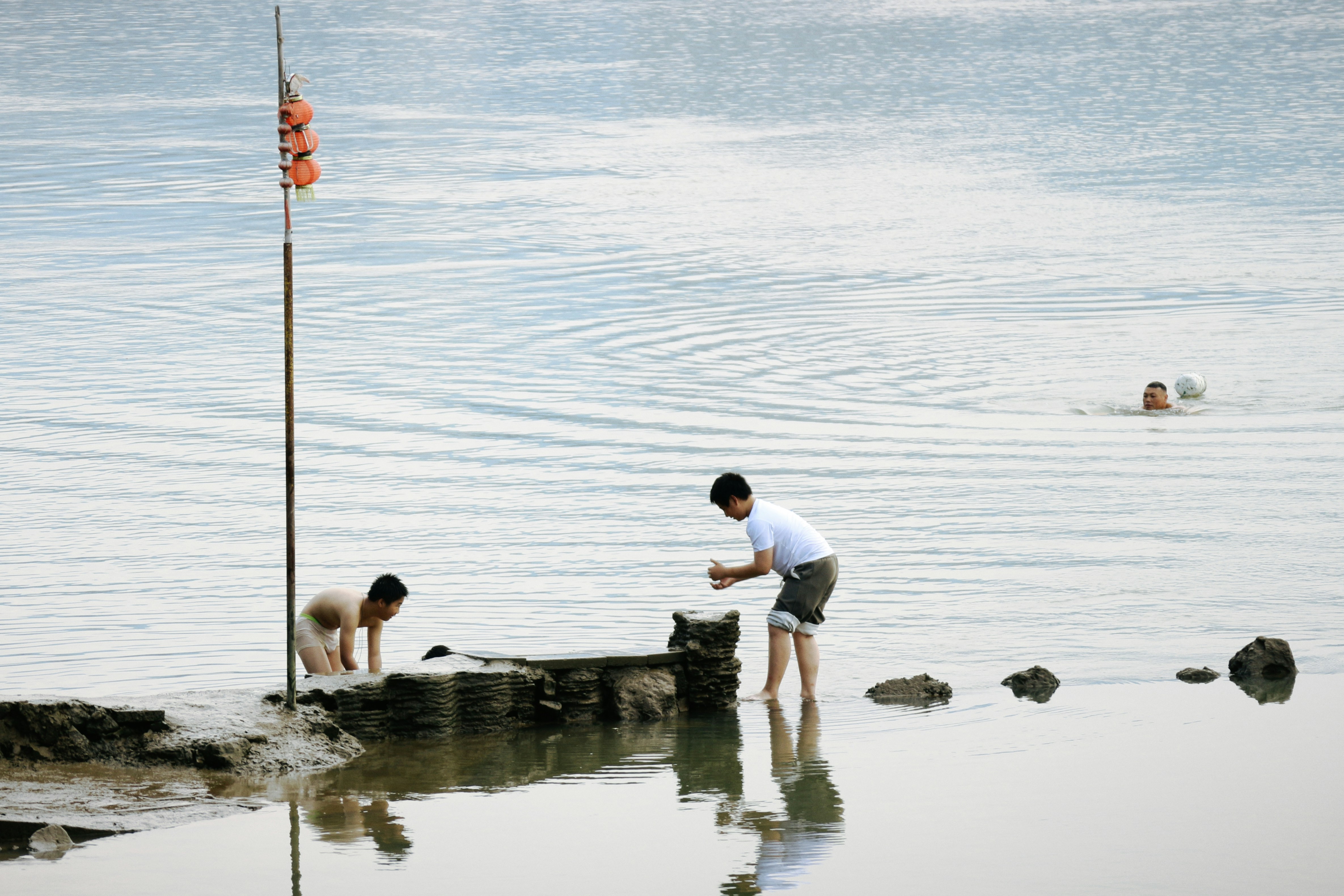 Lifeguards of the Quiet Shore: A Poised Moment