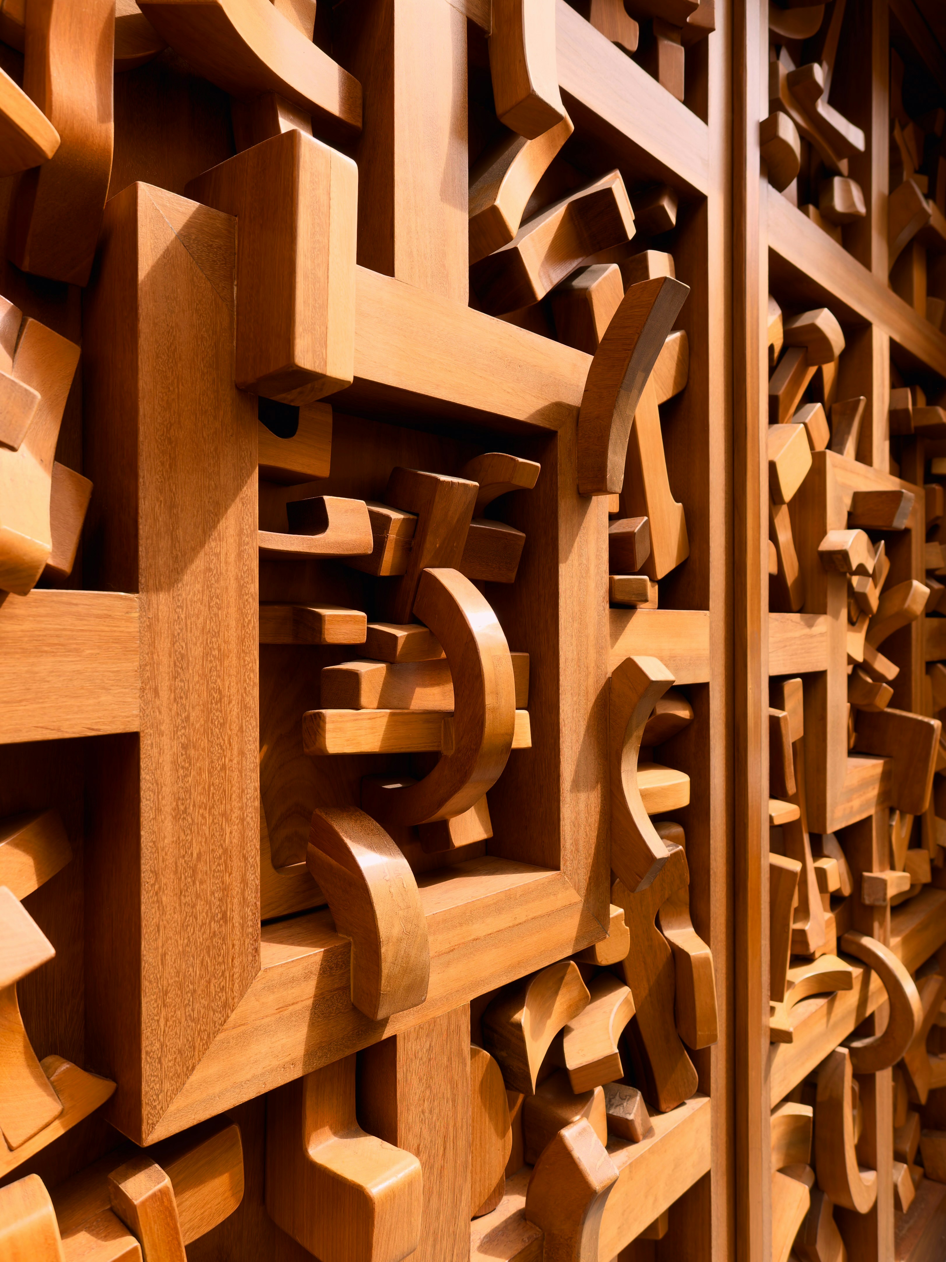 Carved Geometry: A Wooden Lattice of Abstract Frames