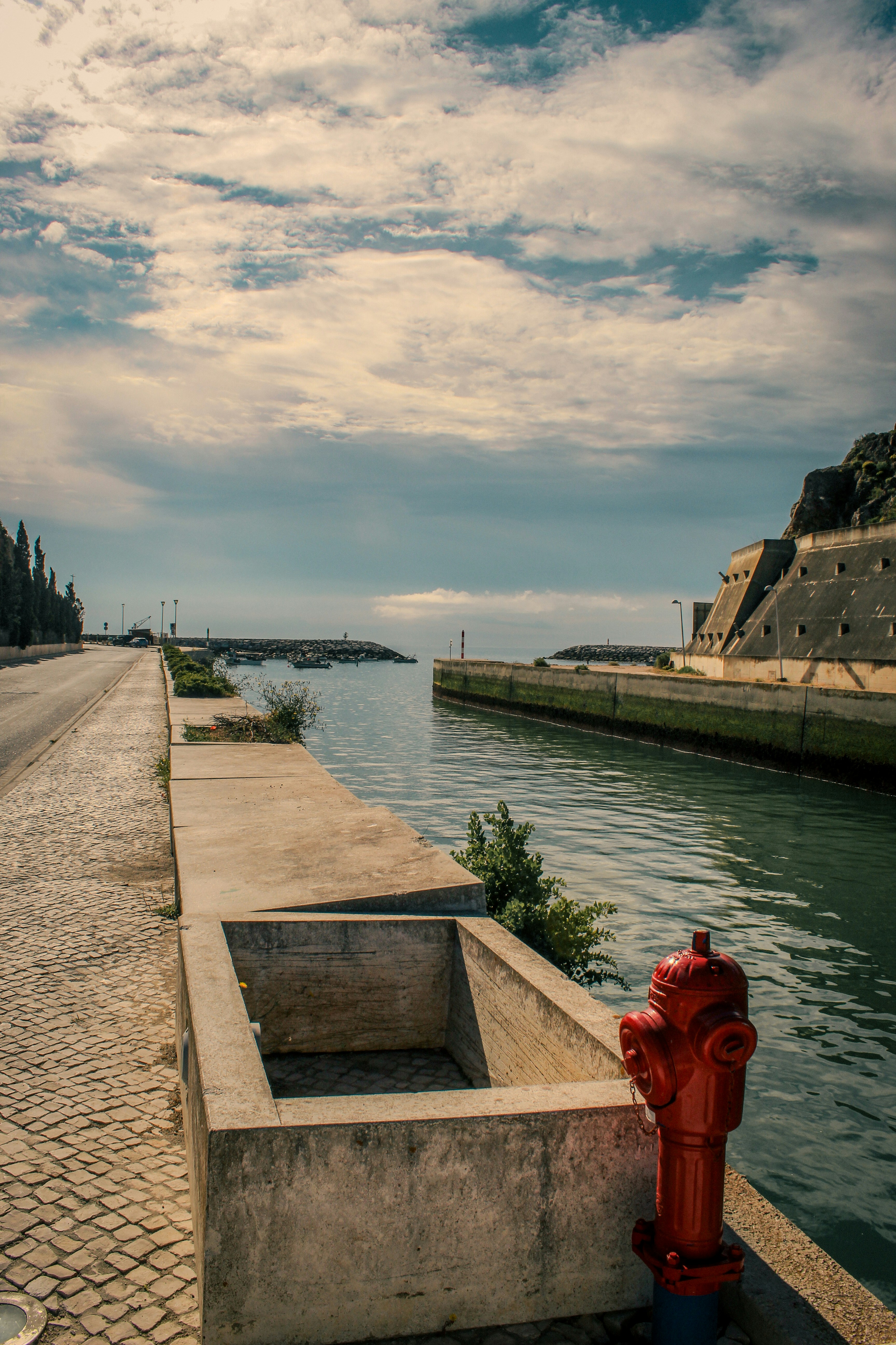 Quayside Quiet: A Waterfront Fortress Bordered by Water and Sky