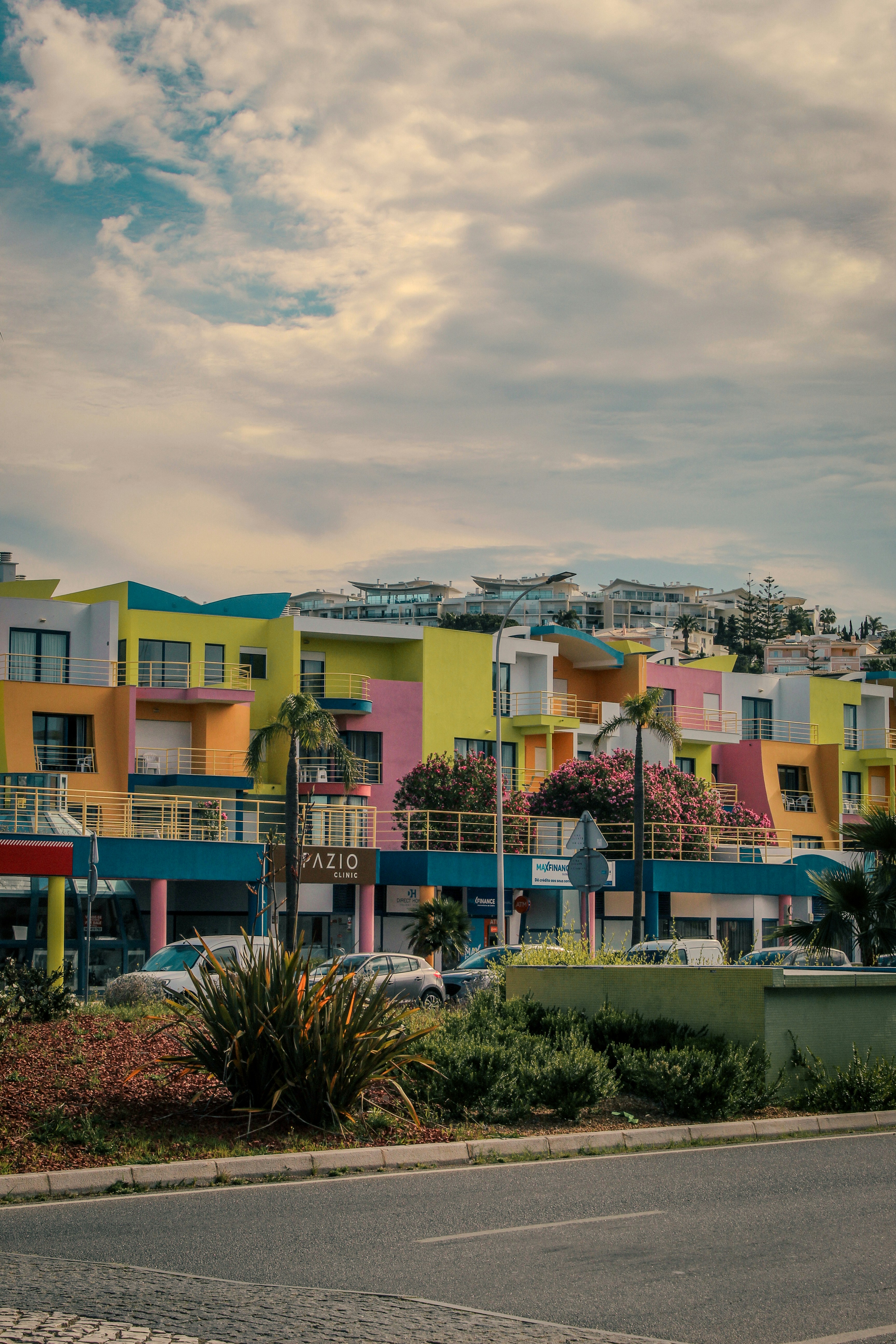 Chromatic Crescent: A Row of Colorful Balconies Over a Quiet Street