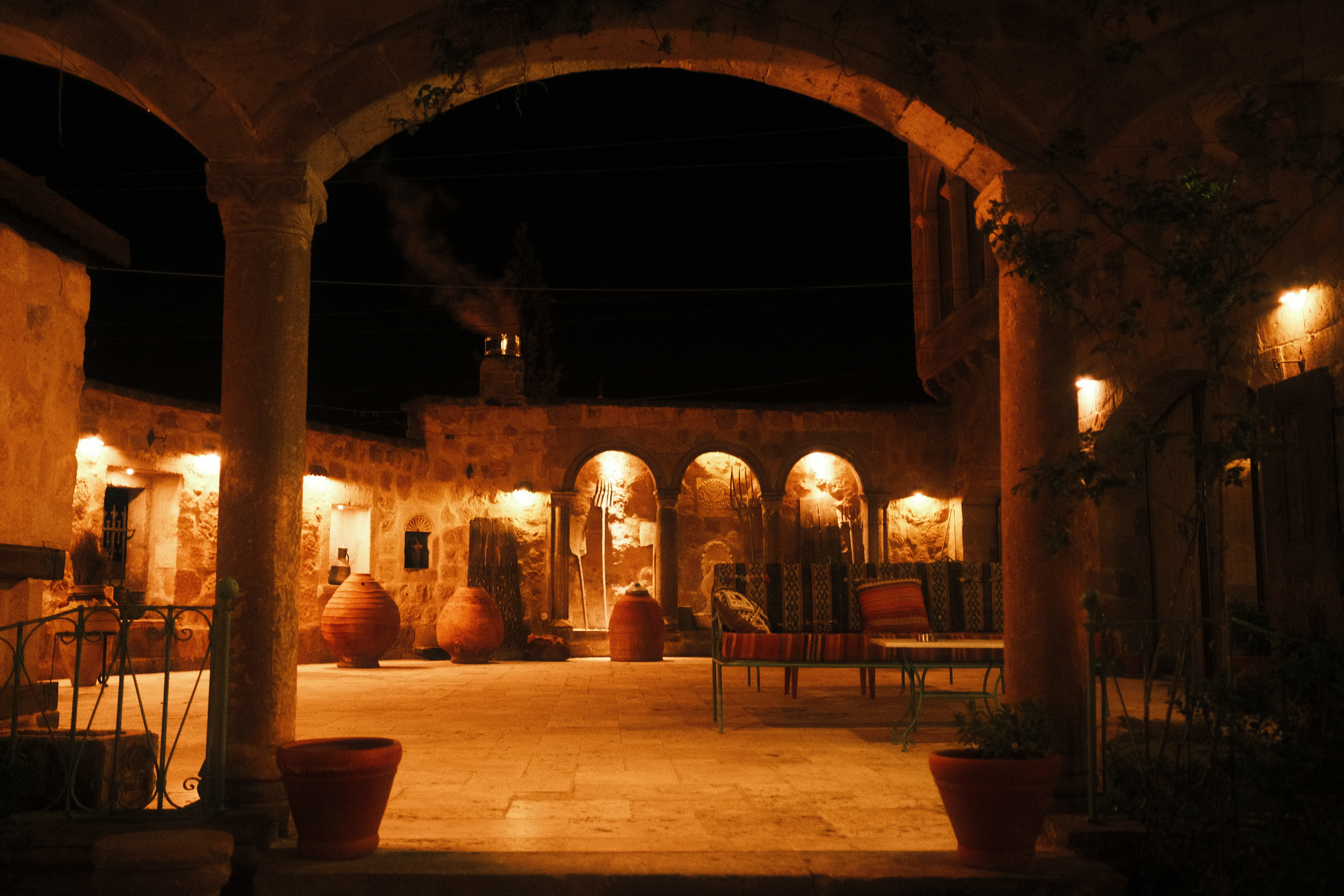 Moonlit Courtyard with Stone Archways