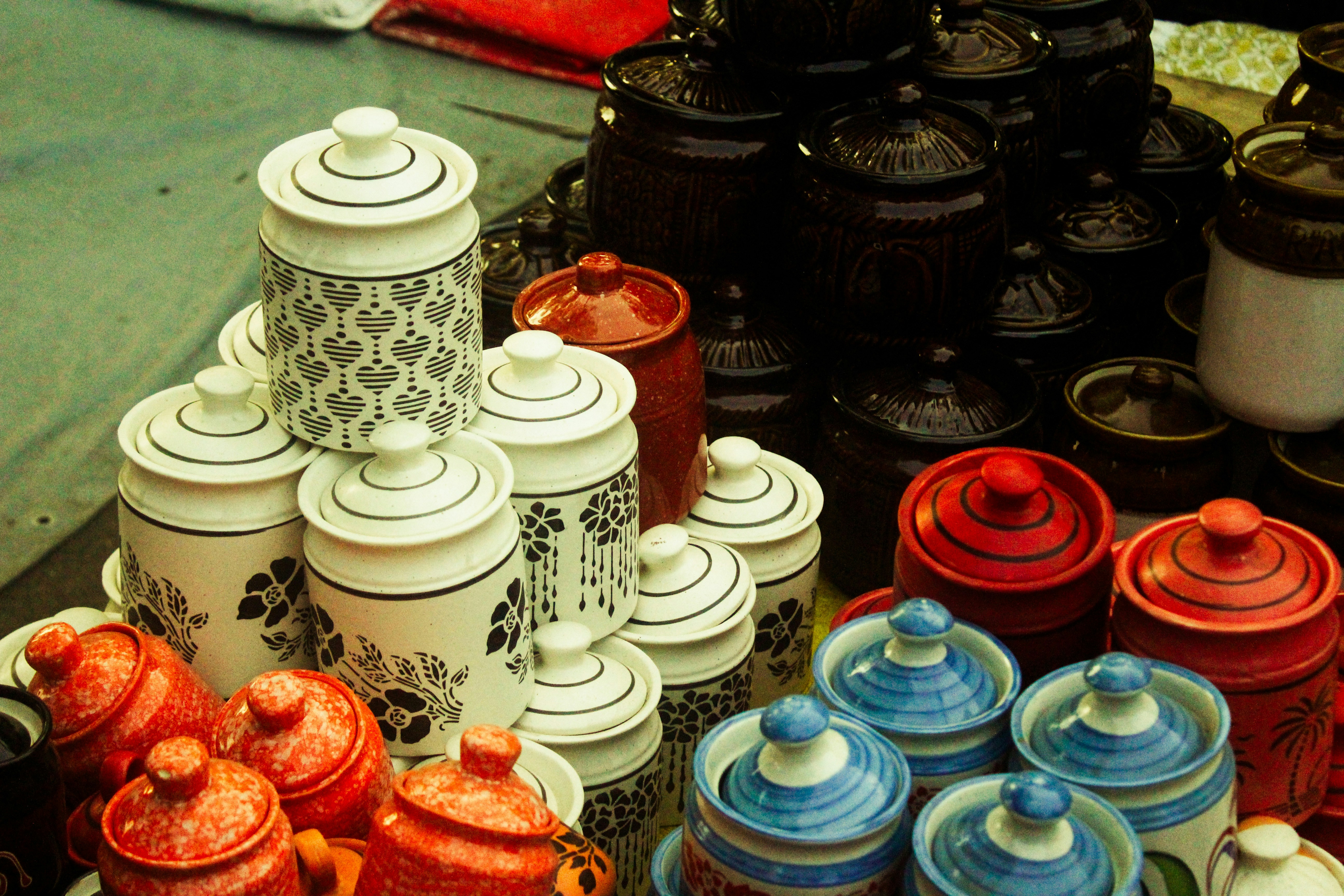 Stacked Ceramics: A Kaleidoscope of Vintage Jars and Pots