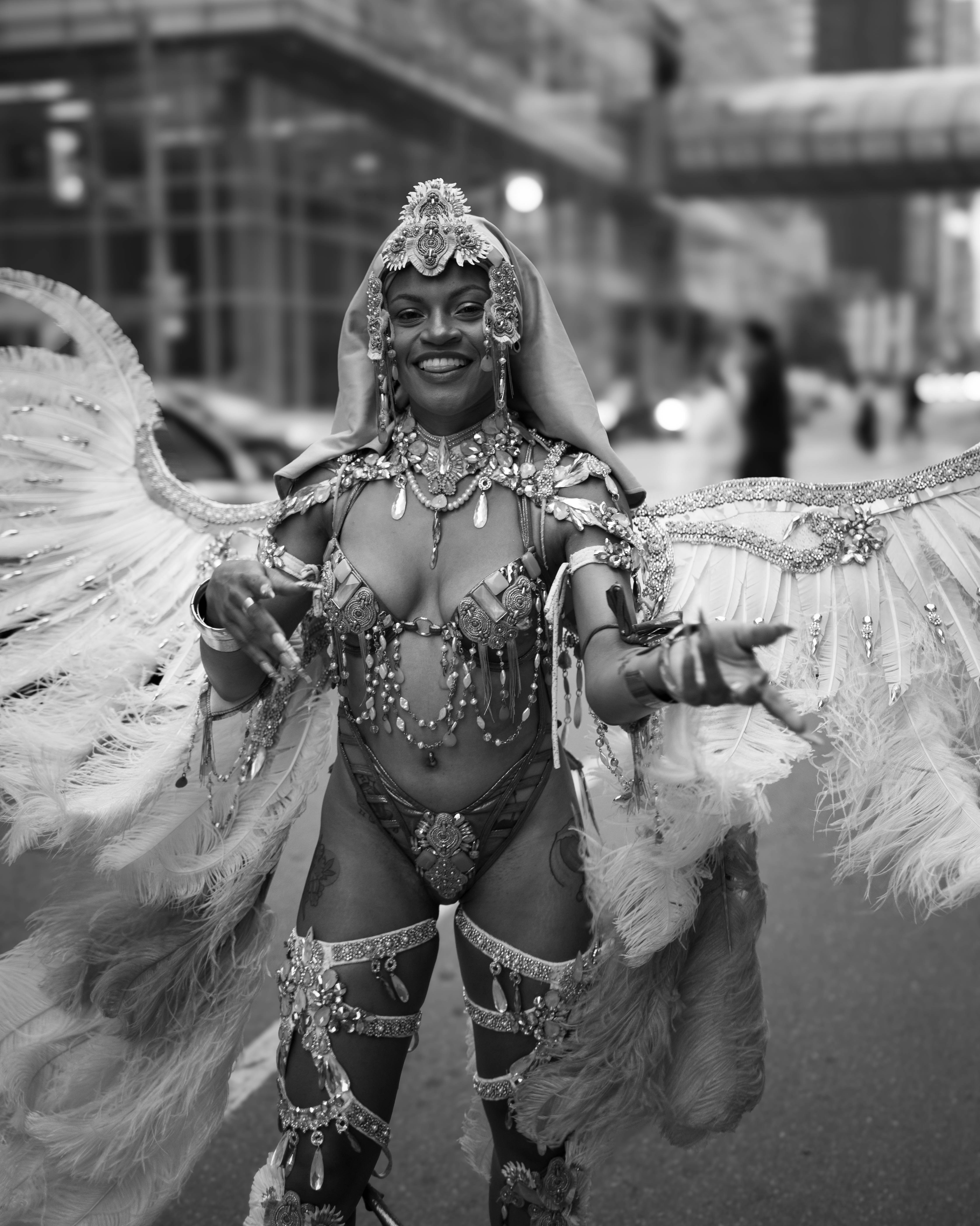 Midnight Carnival Queen: Piercing Smile Beneath Feathered Wings