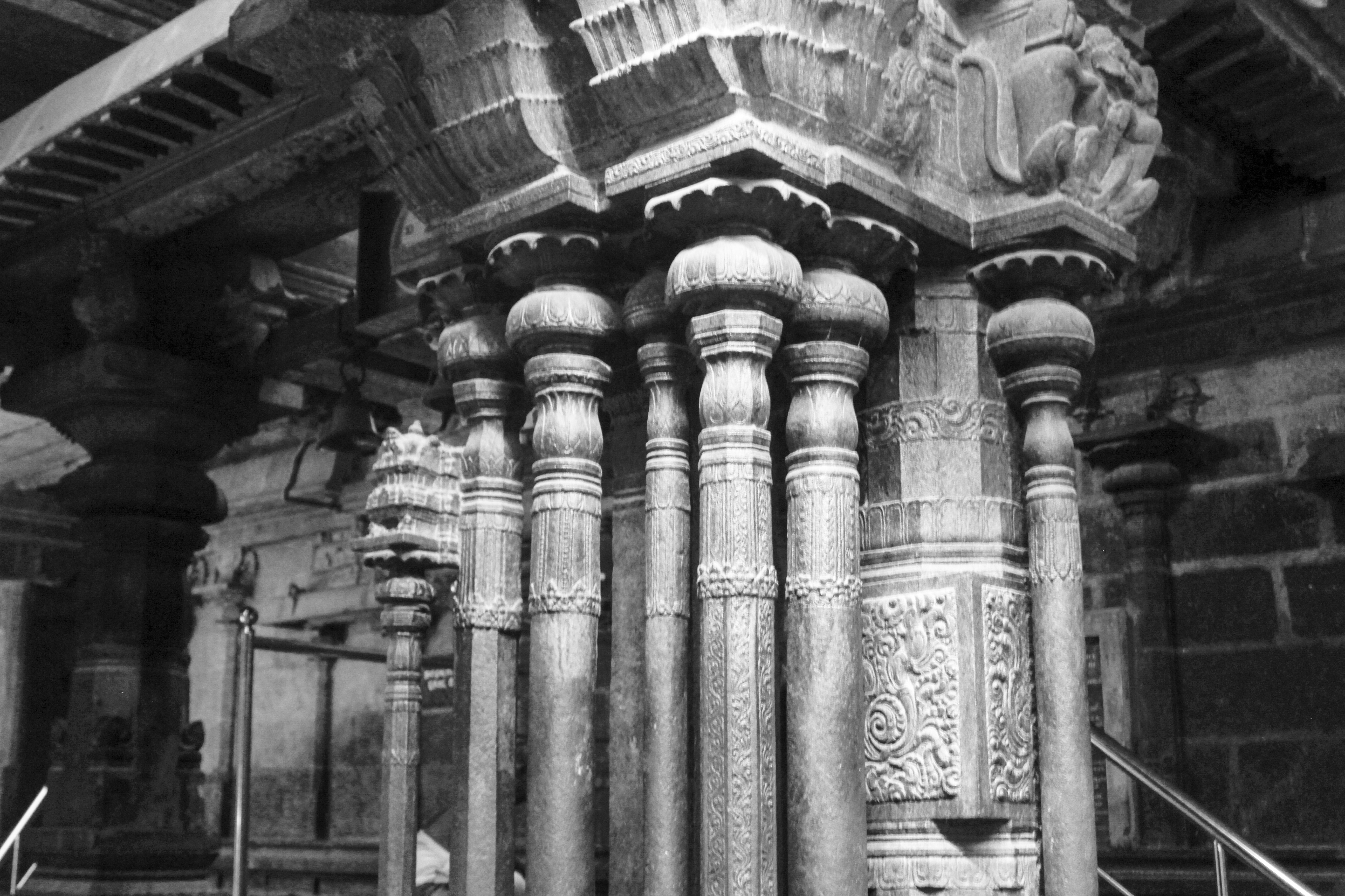 Carved Columns of the Temple: An Ode to Stonework in Shadow