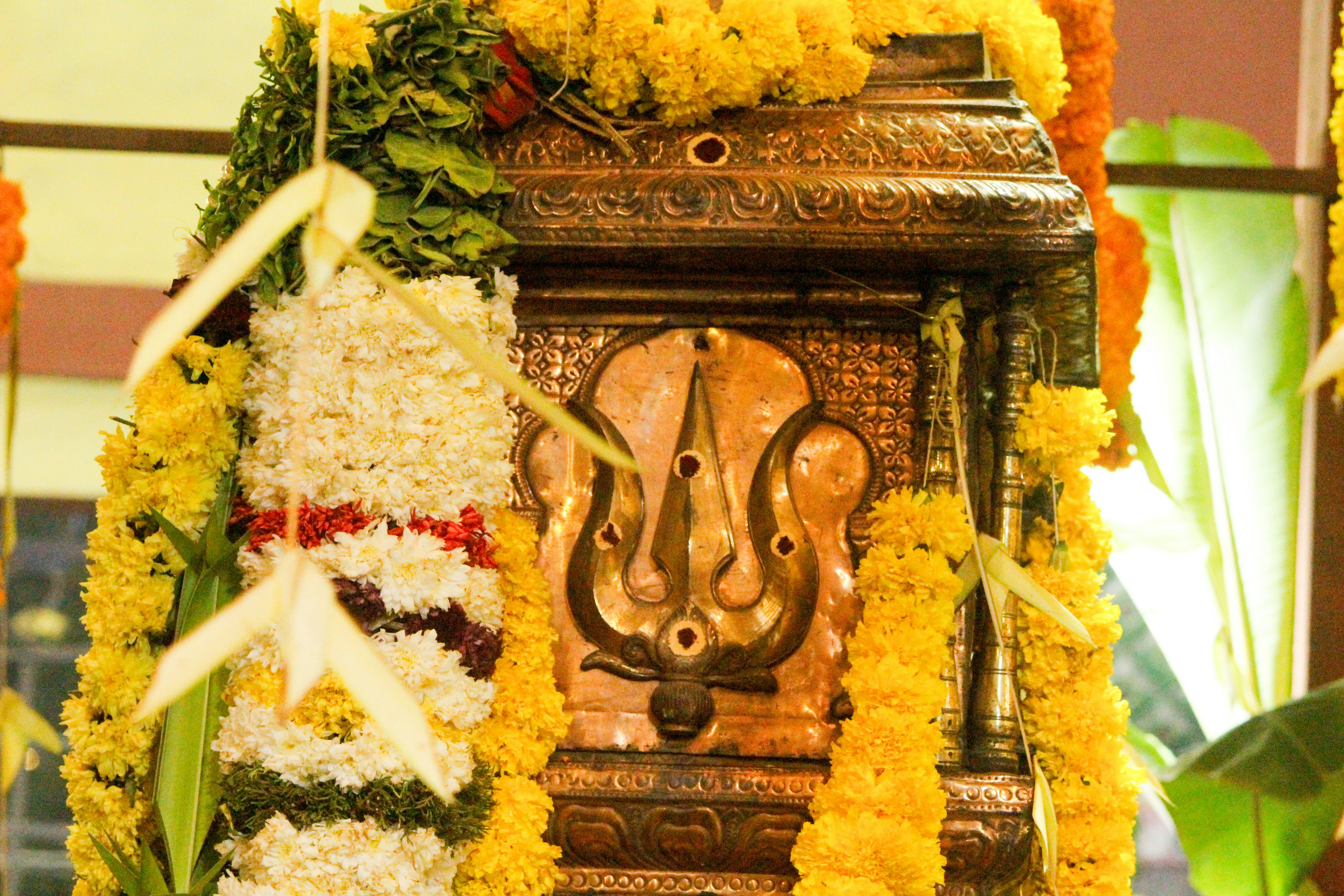 Floral Frame: An Ornate Shrine Engraved in Gold and Marigold