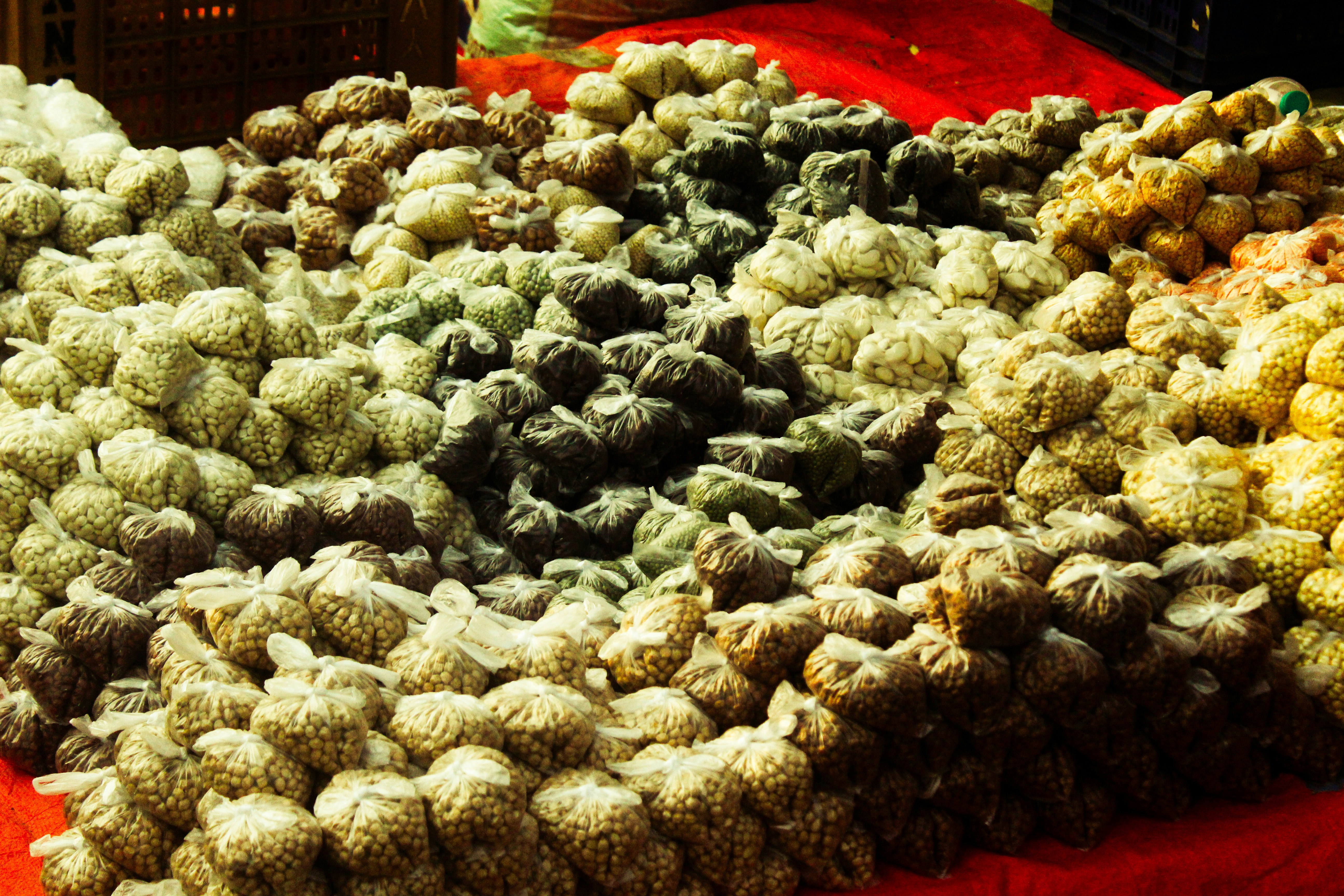 Streetside Display: Pineapple-like Clusters on a Market Table
