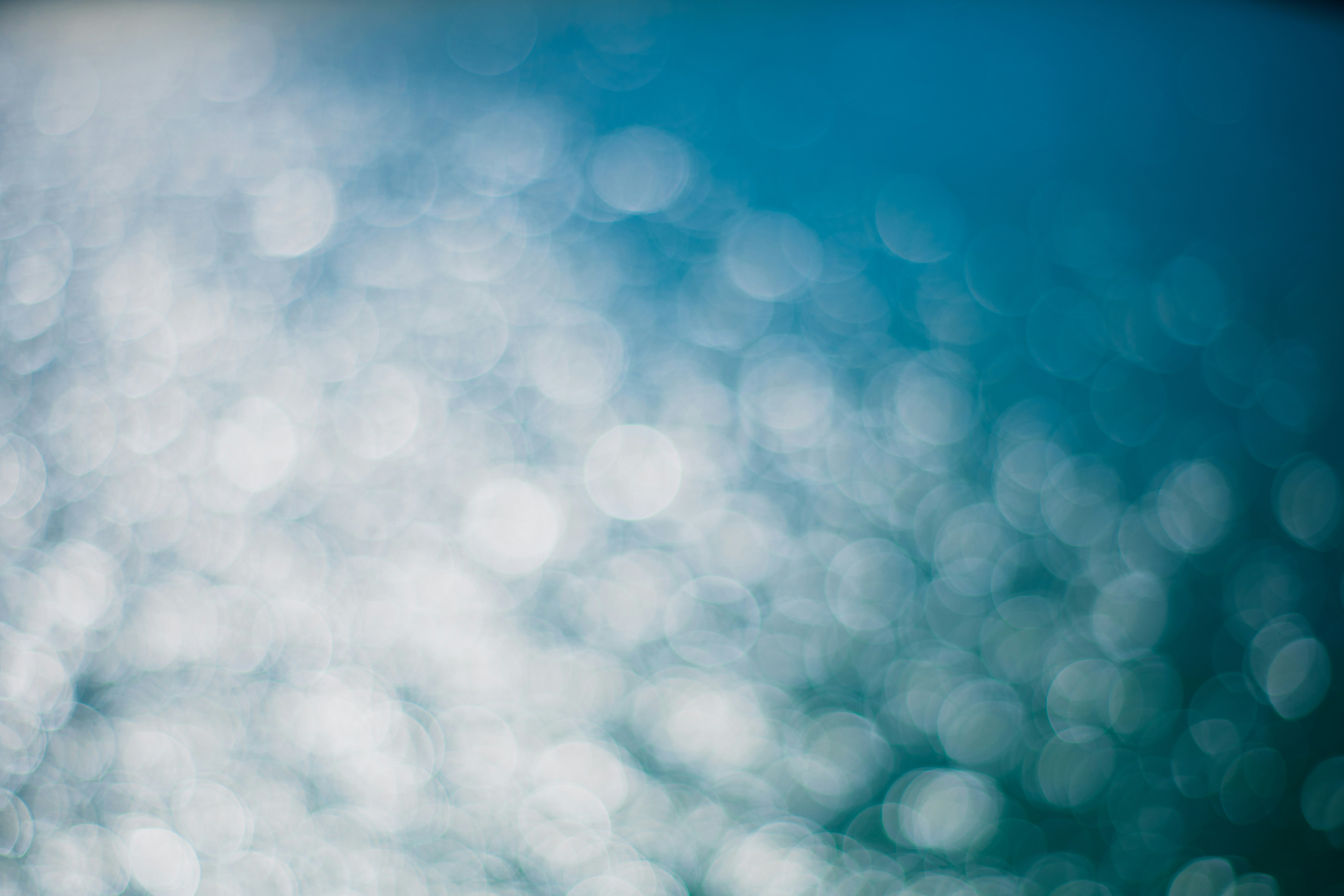 Bokeh Currents: Soft Focus Waves of Blue Light
