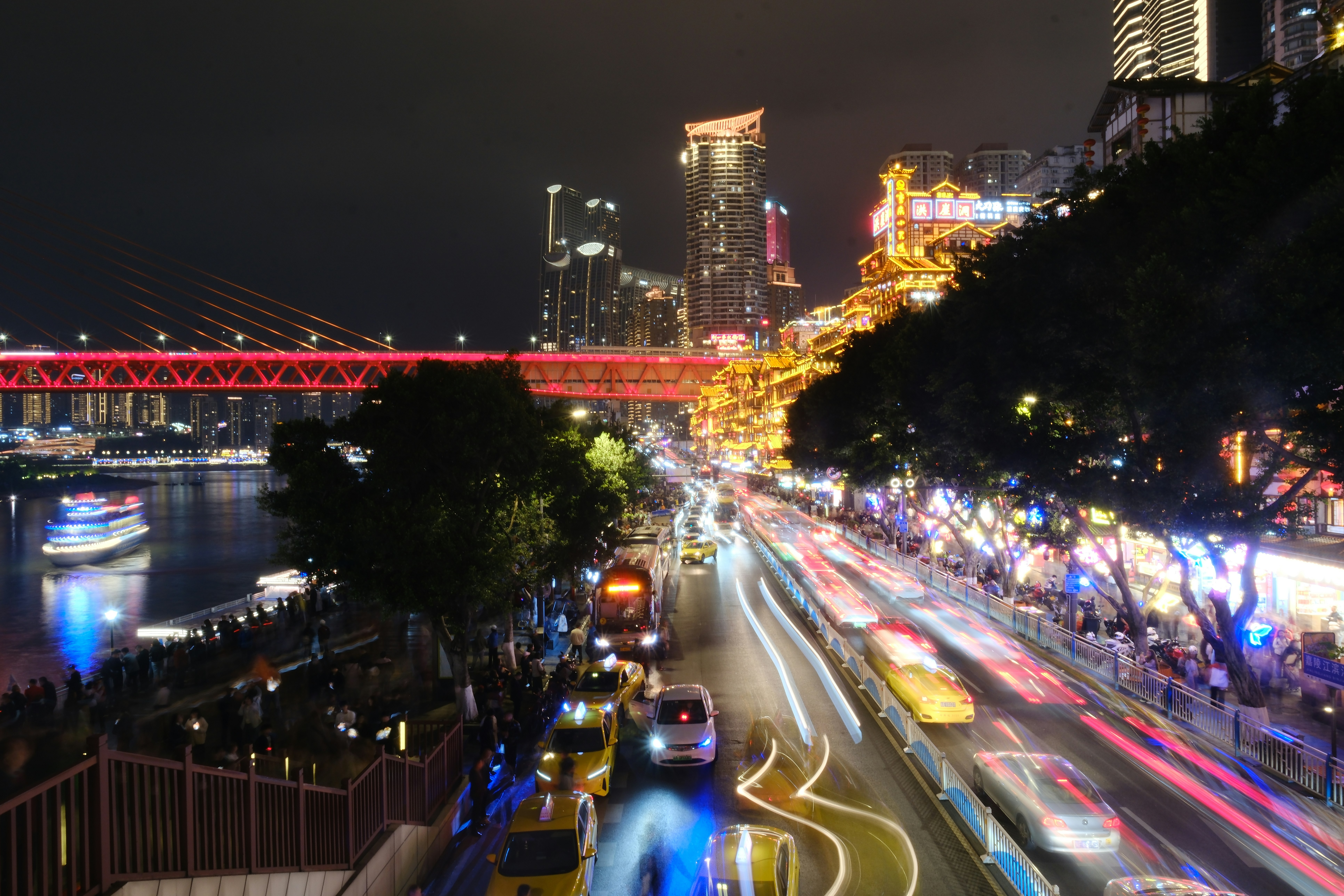 Neon Riverfront: A Blur of Light and Motion