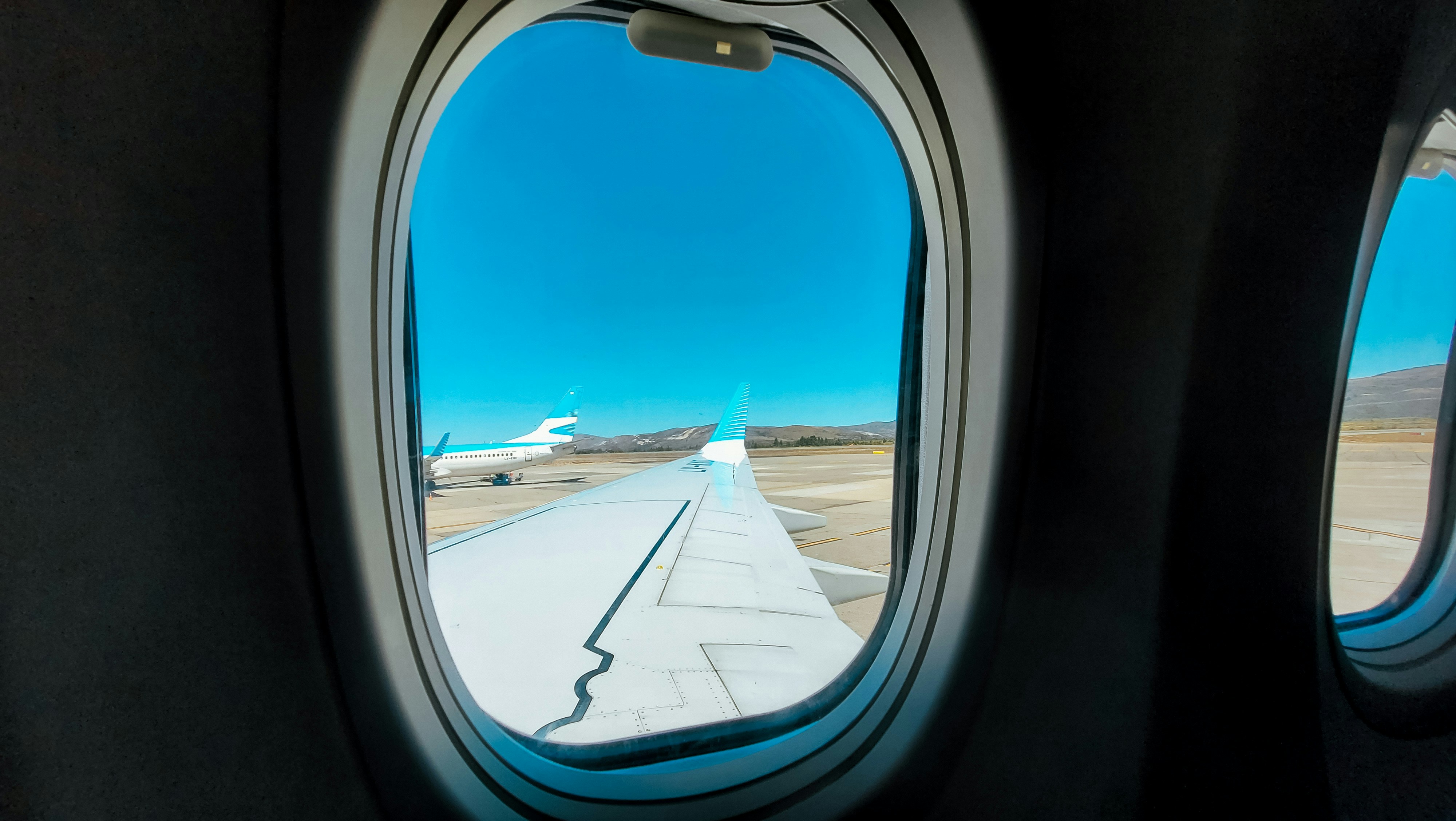 Window to the Wing: Aerial Horizon from the Aircraft Window