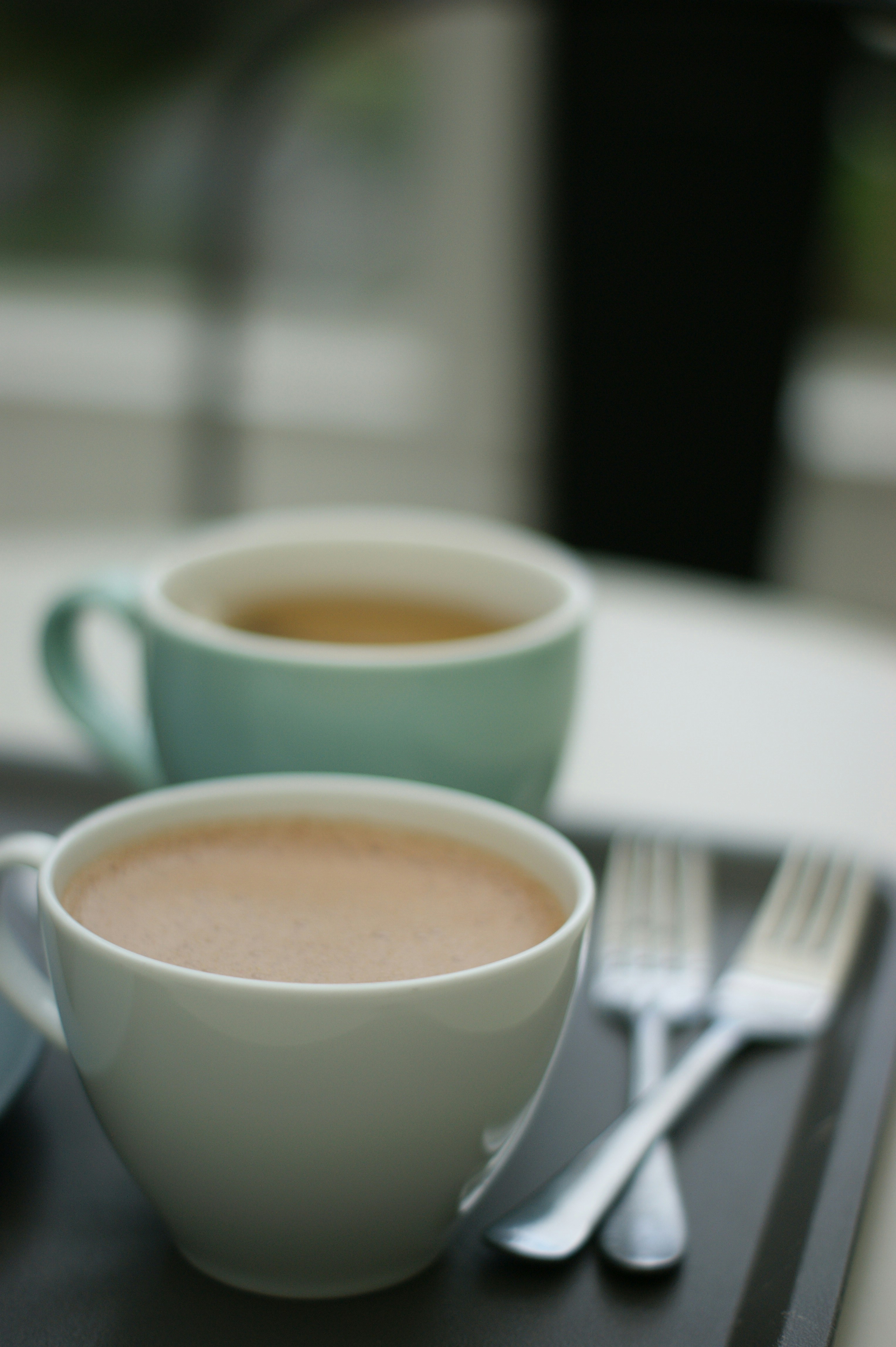 Cafe Moments: Two Steam-Kissed Cups on a Quiet Table
