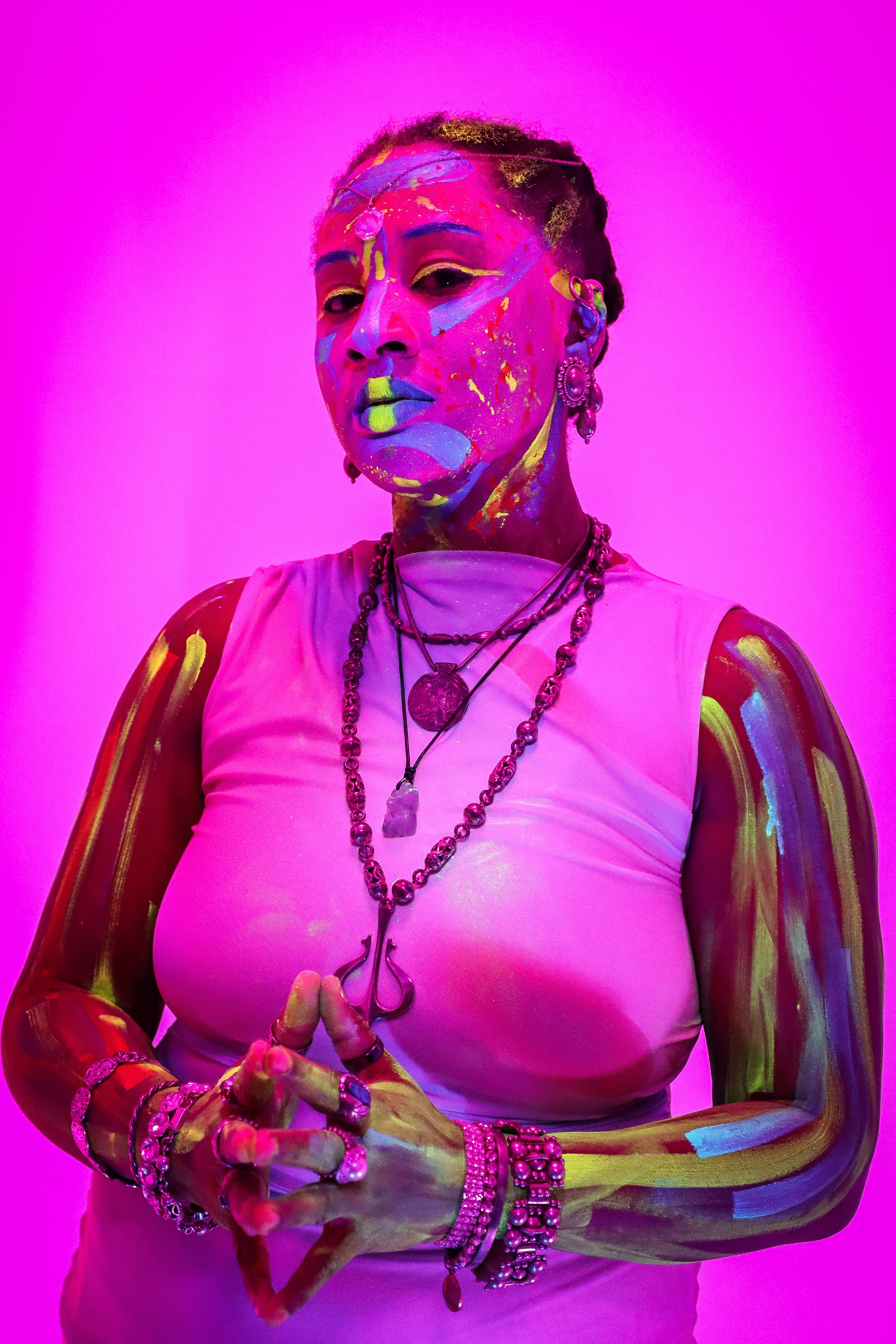 Neon Goddess: Paint-Splashed Portrait in Electric Magenta