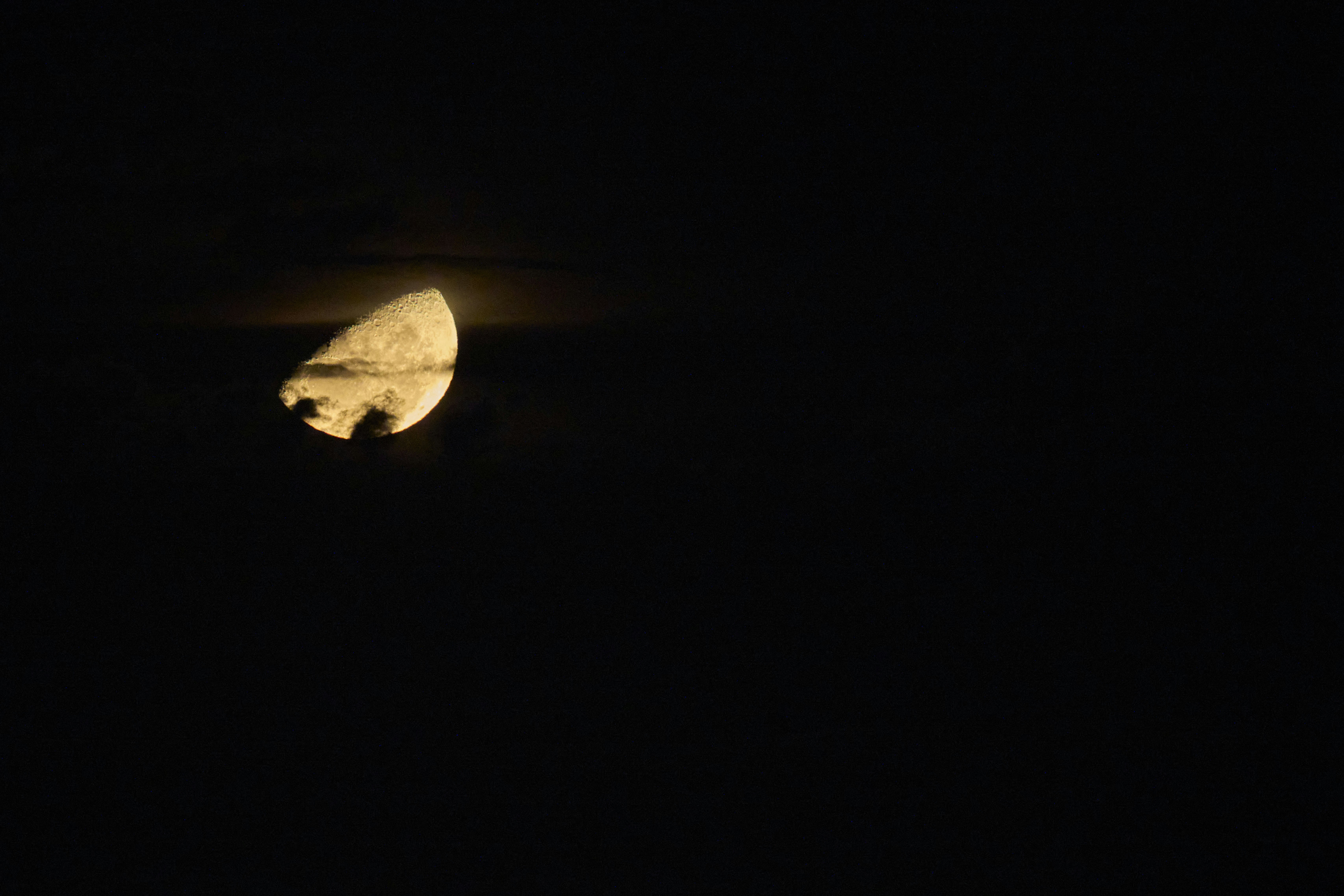 Moonlit Sliver: A Tempest of Light in the Dark