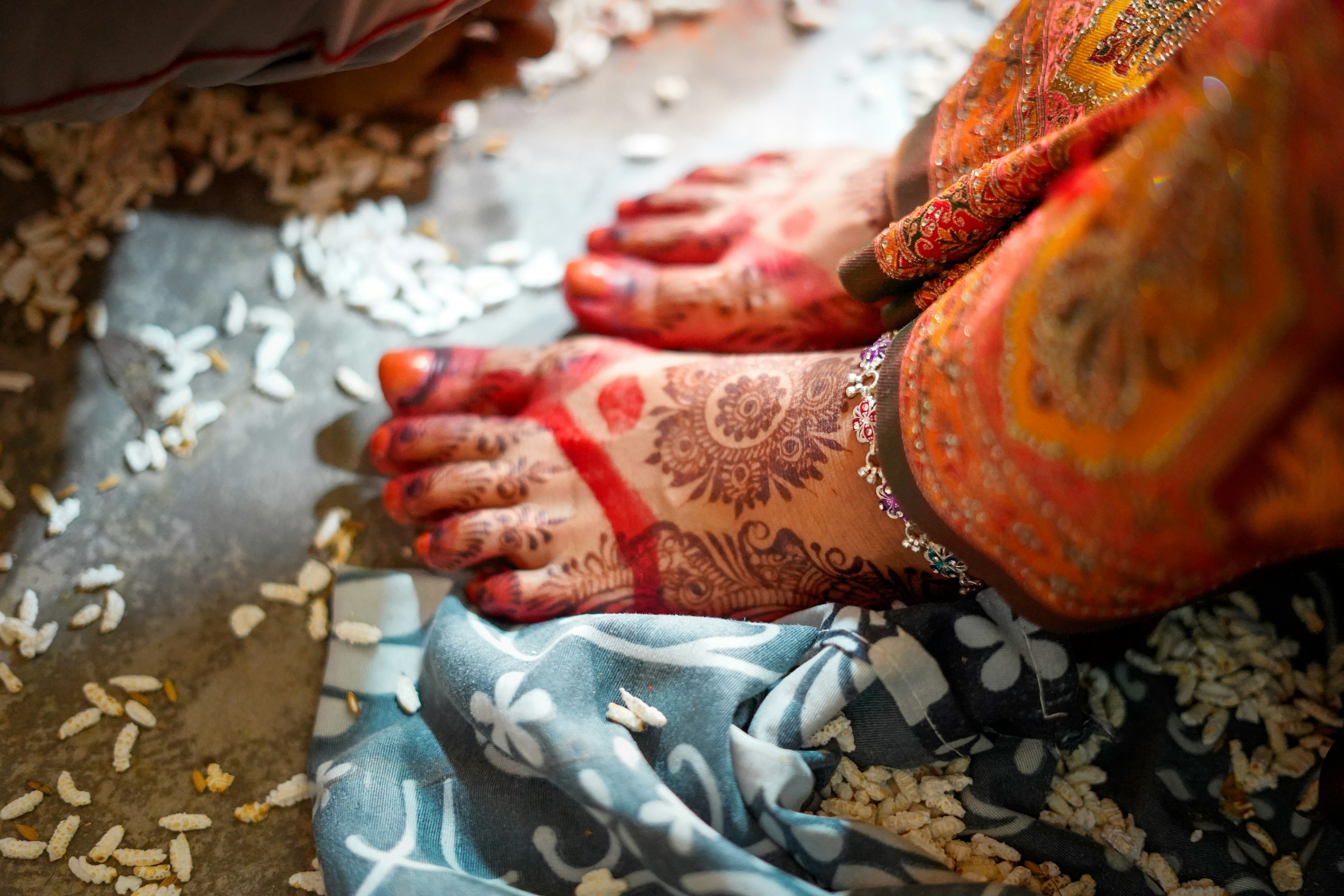 Hennaed Feet and Floral Fabric: A Ritual Scene on Petal-Soft Ground