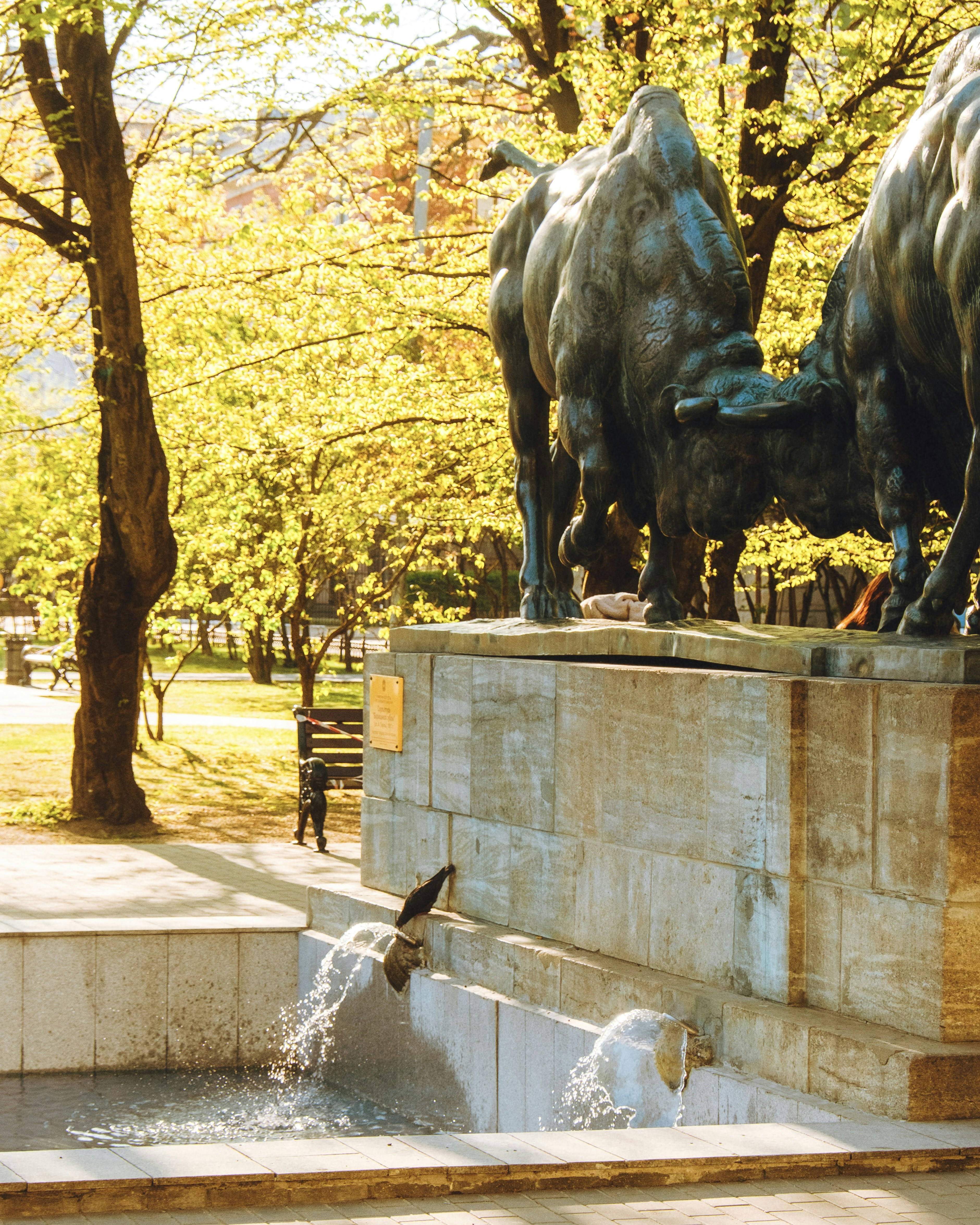 Autumn Fountain Statues: A Golden Park Moment