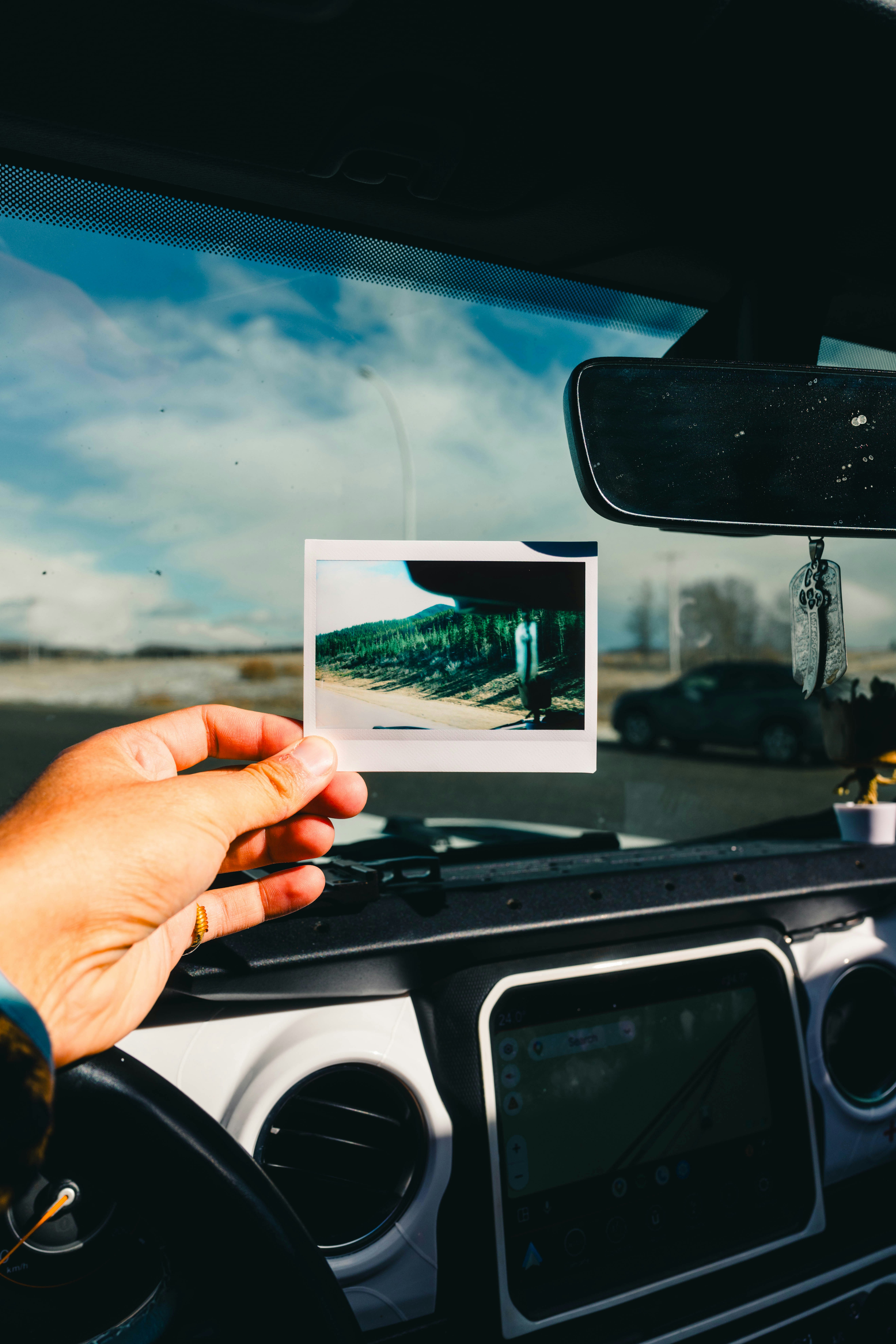 Polaroid Moment on a Dash-Front Drive