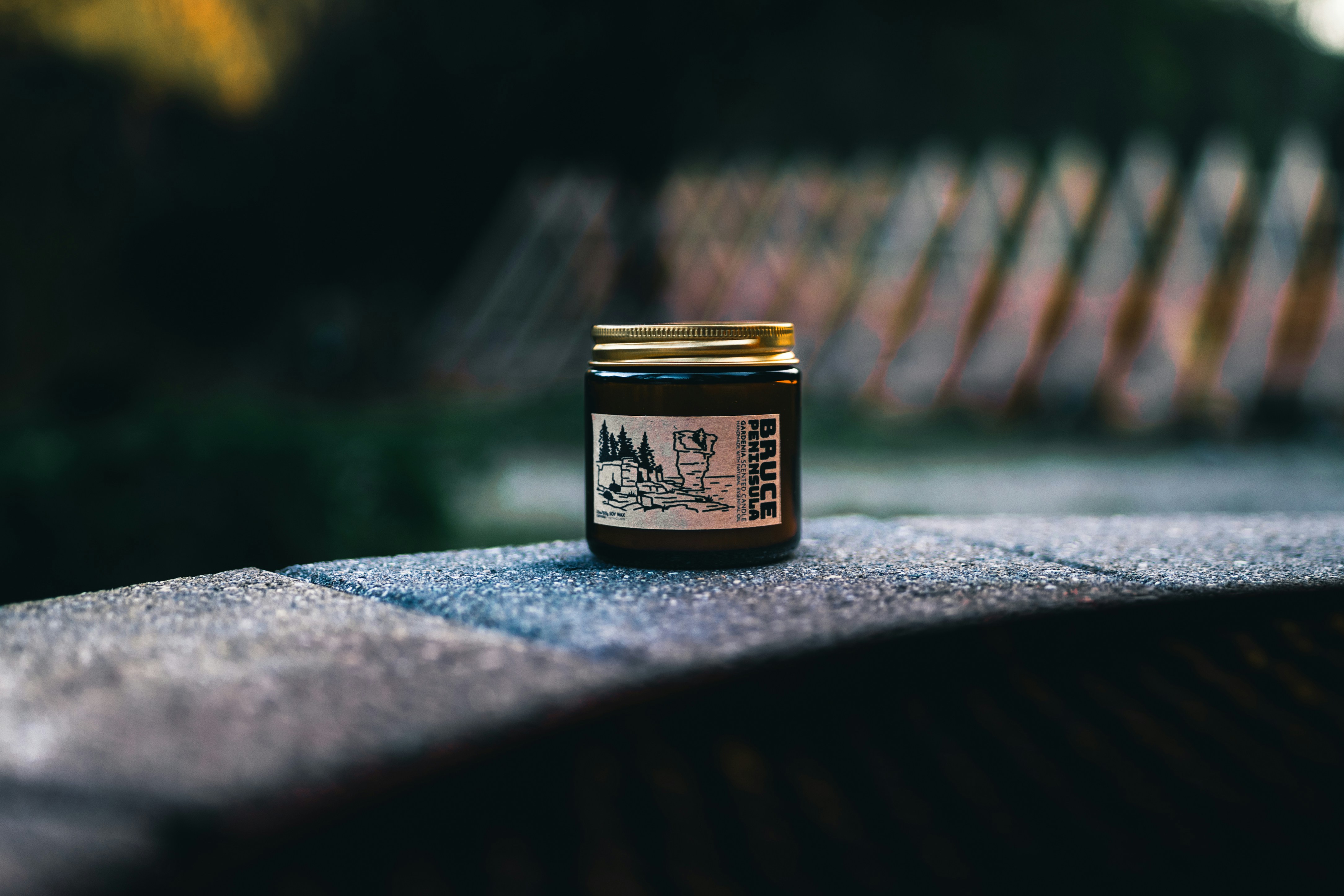 Miniature Jar, Maximal Detail: A Close‑Up of a Label in Soft Evening Light