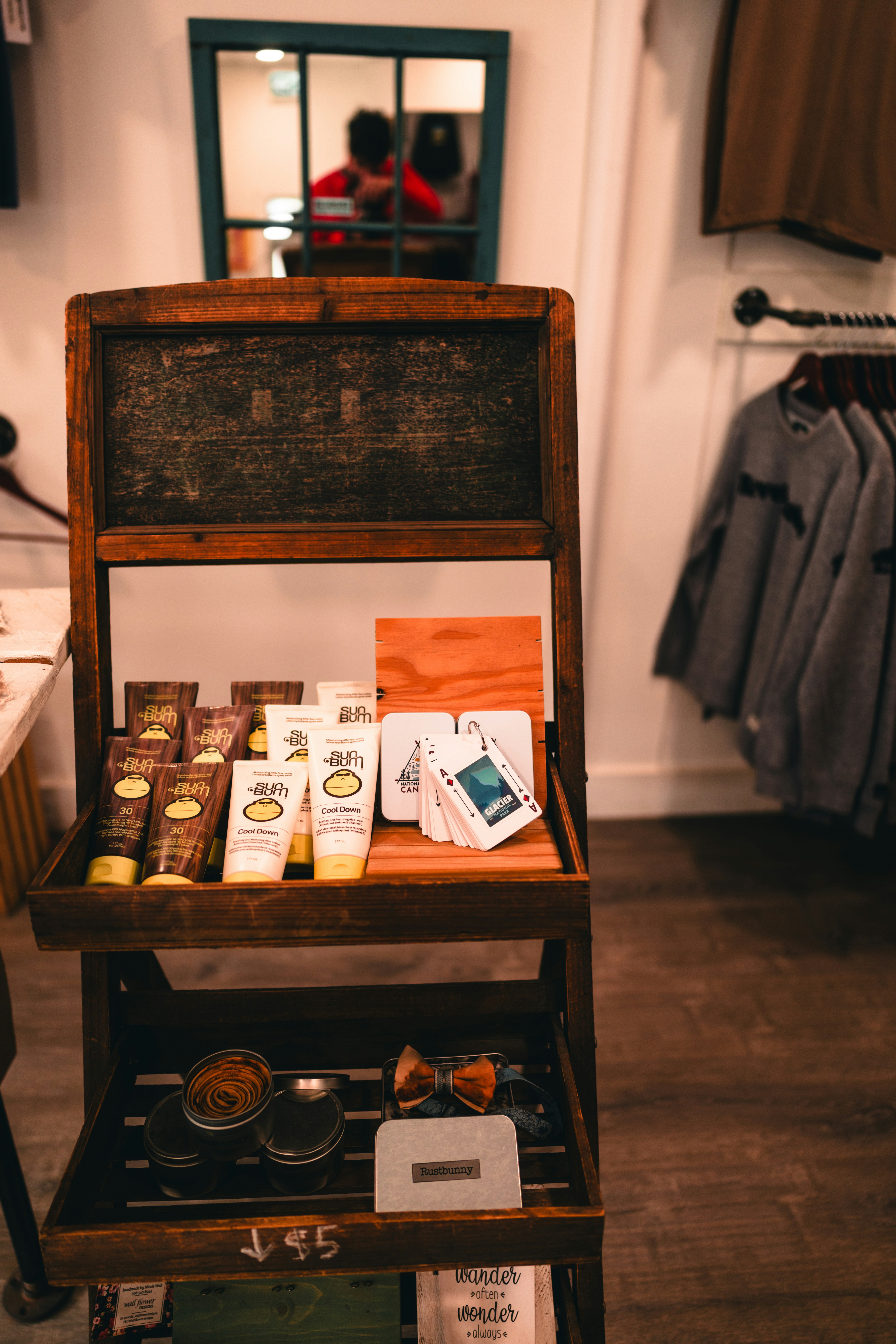 Vintage display case in a boutique studio with grooming products