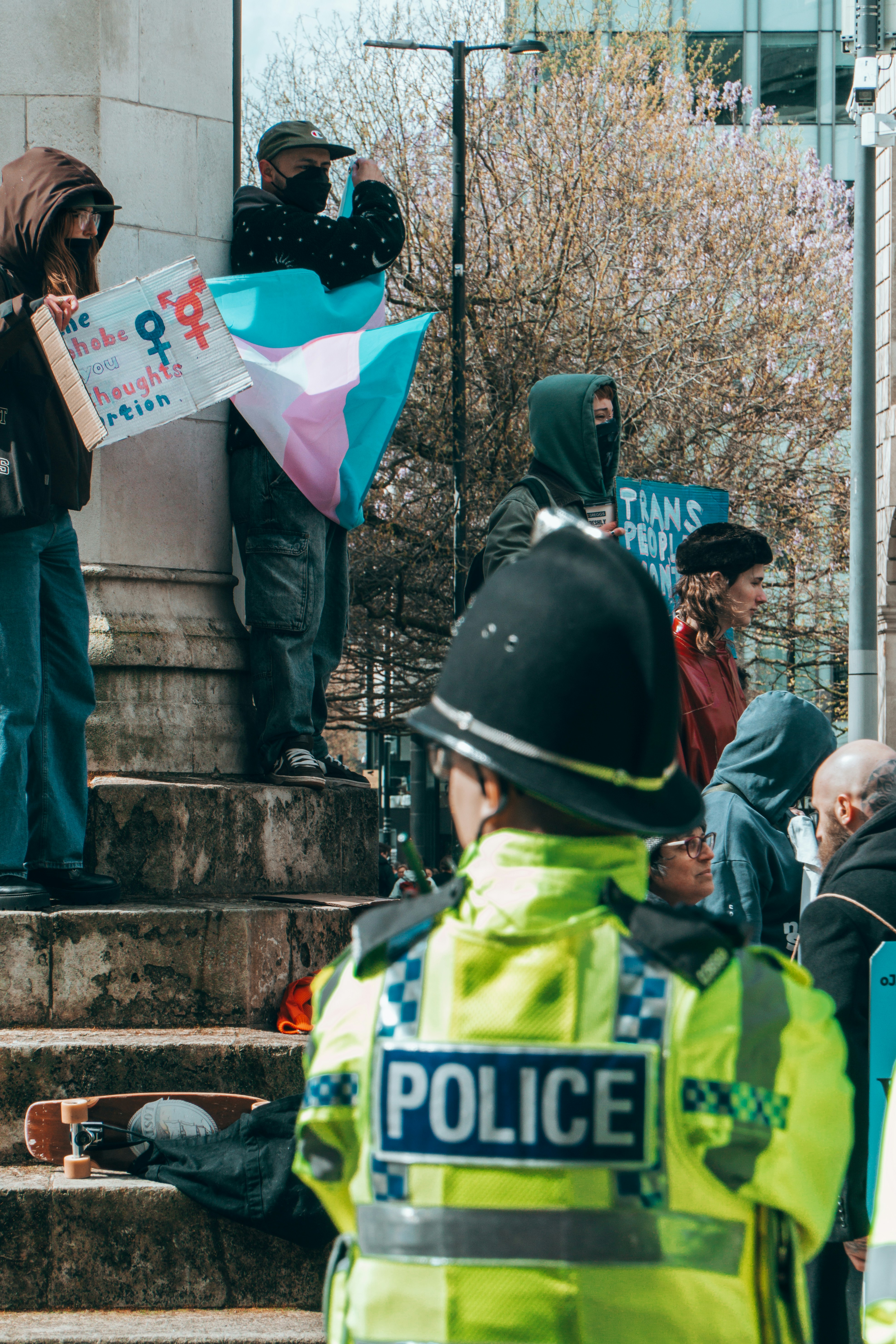 Rally at the Steps: a police presence meets a diverse crowd beneath civic stonework